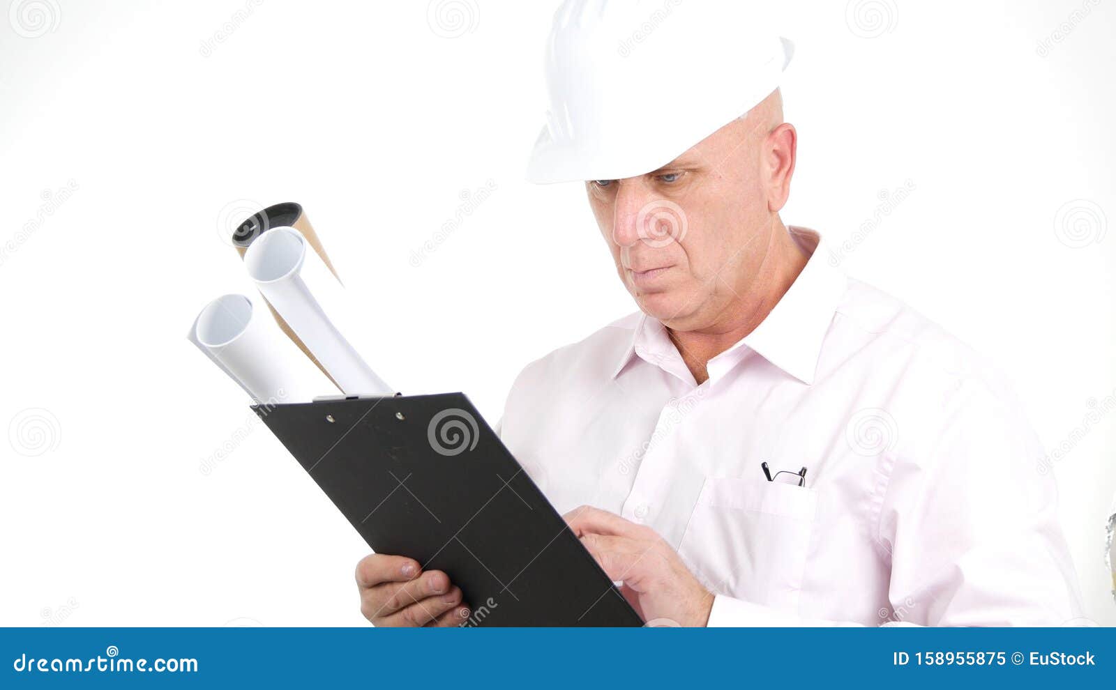 Image with Engineer Reading Technical Plans for a Building Construction ...