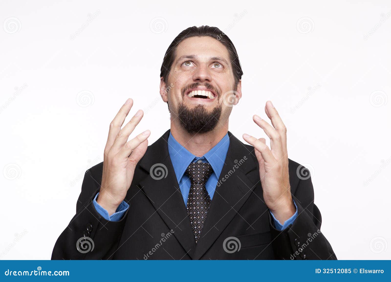 Image of an Excited Young Businessman Looking Upwards Stock Image ...
