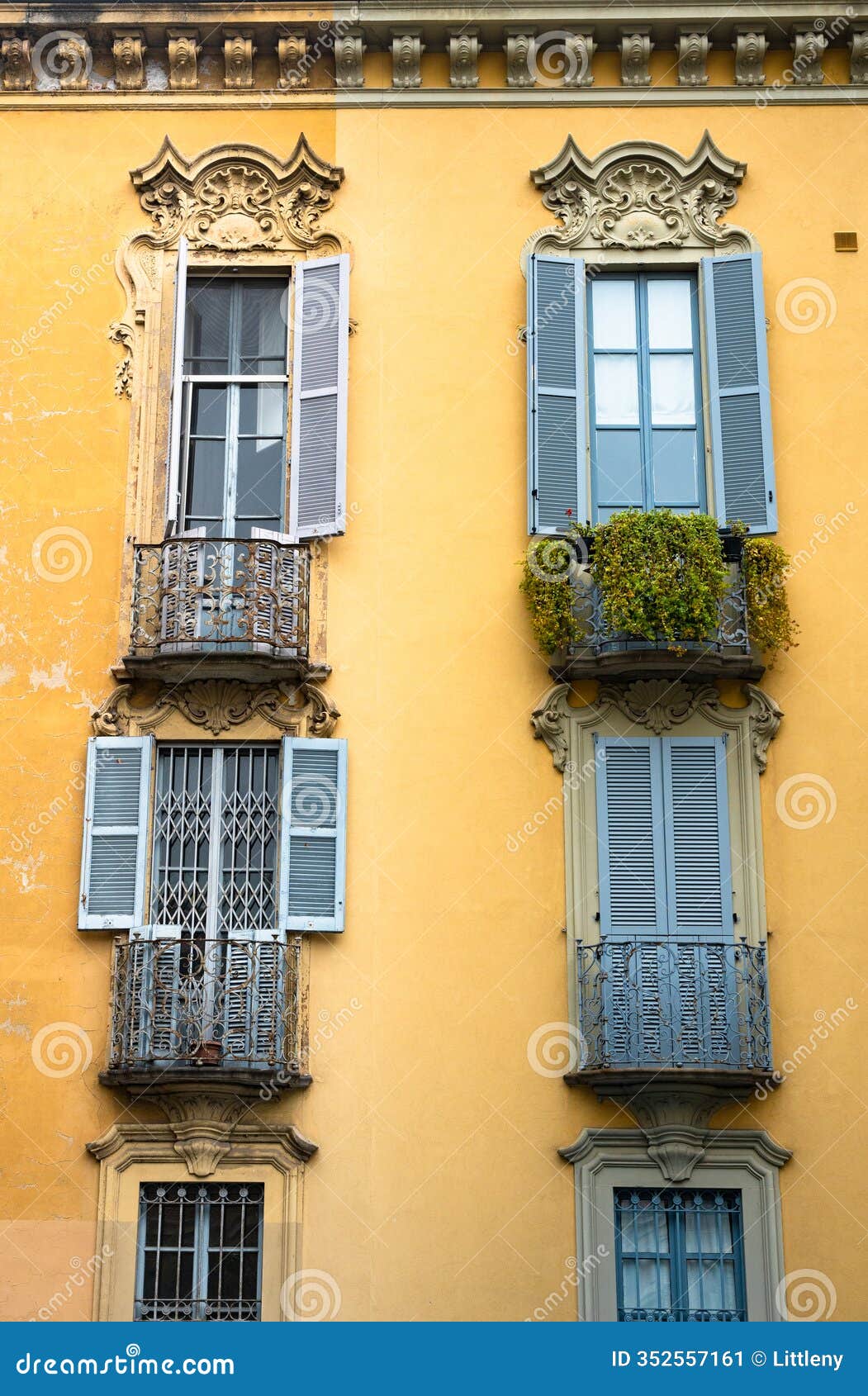Facade of Old Yellow Building with Shuttered Windows Stock Image ...