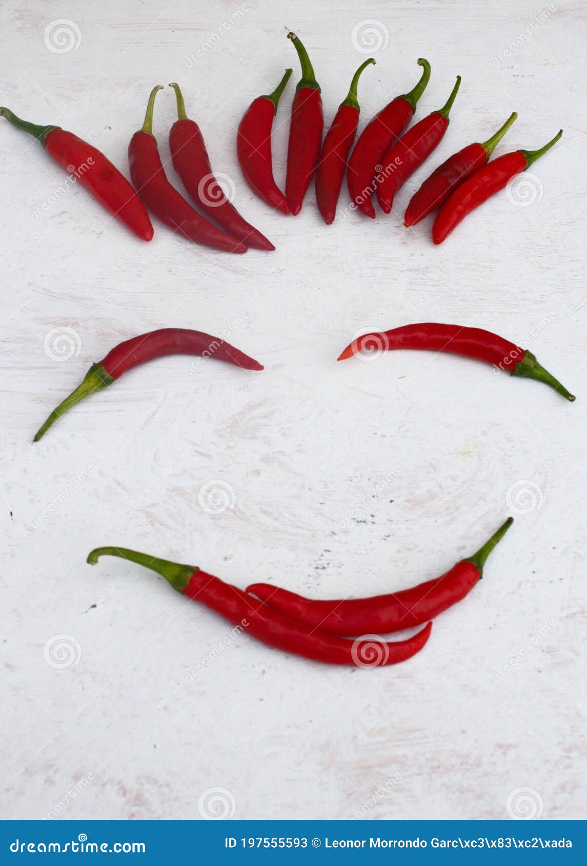 Image of Face Shaped Hot Chilli Peppers on White Background Stock Image ...