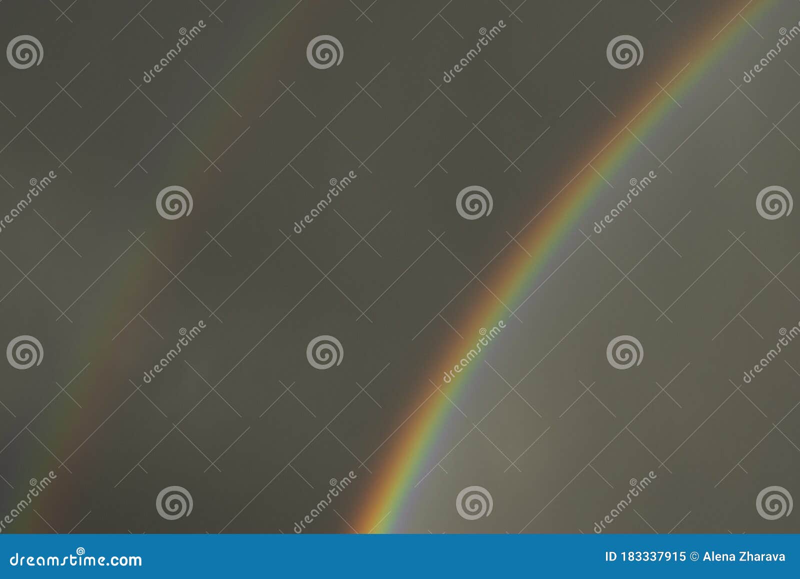 An Image of a Fading Rainbow Surrounded by a Clouded Sky, Conflicted by ...