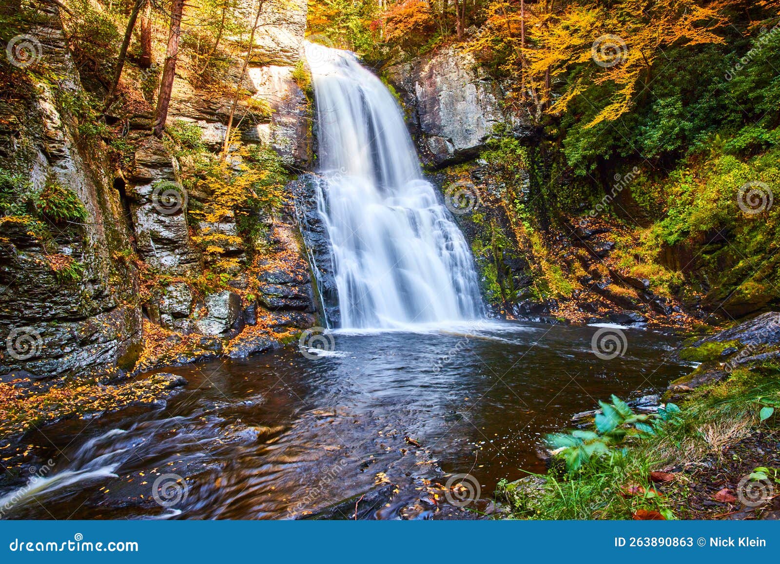 Fall Foliage Surrounds Cliffs and Huge Waterfall Over Cliffs in Peak ...