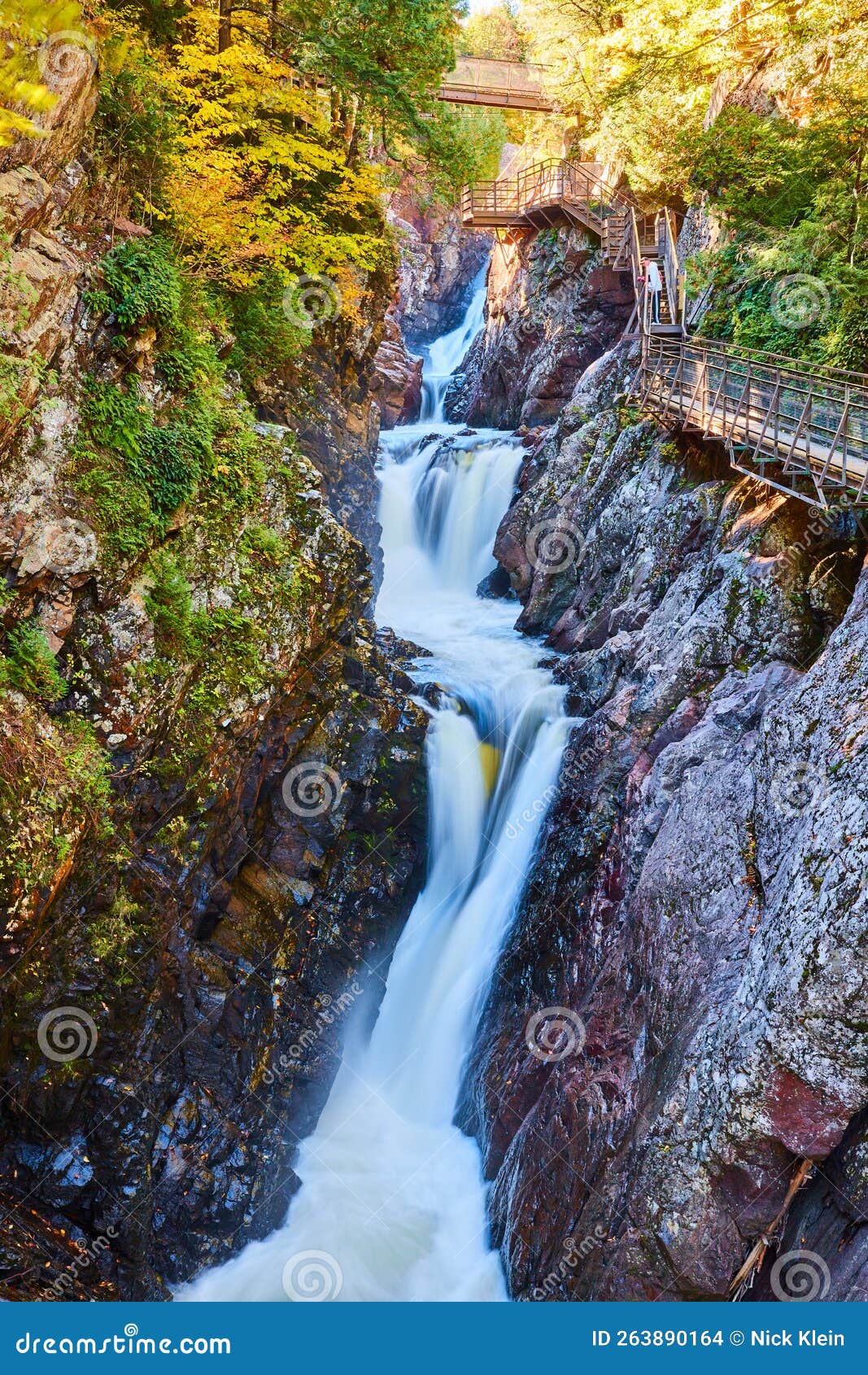 Fall Forest and Cliffs with Tiers of Heavy Waterfall Rapids with ...
