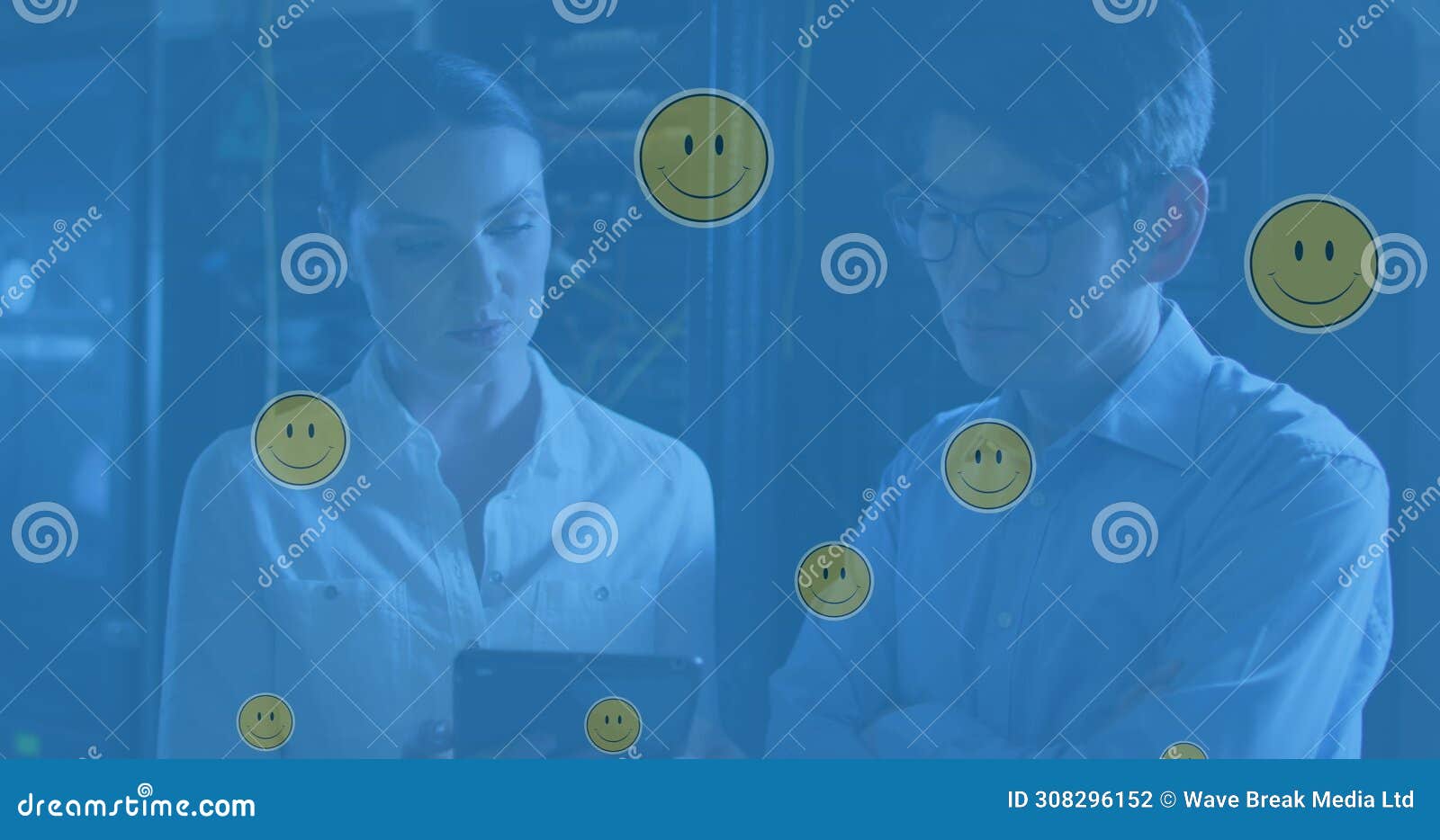 Image of Falling Emoji Over Diverse Couple of Server Room Workers Stock ...
