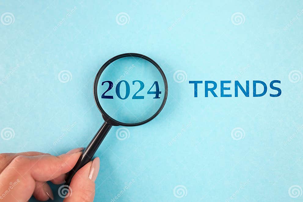 The Image Features Magnifier Glasses with the Text New Year 2024 Trends ...