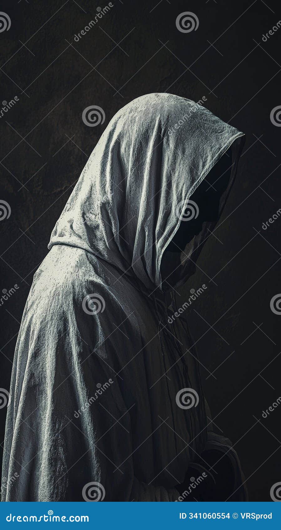 Hooded Figure in Soft Lighting with Dark Shadowed Face Profile Stock ...