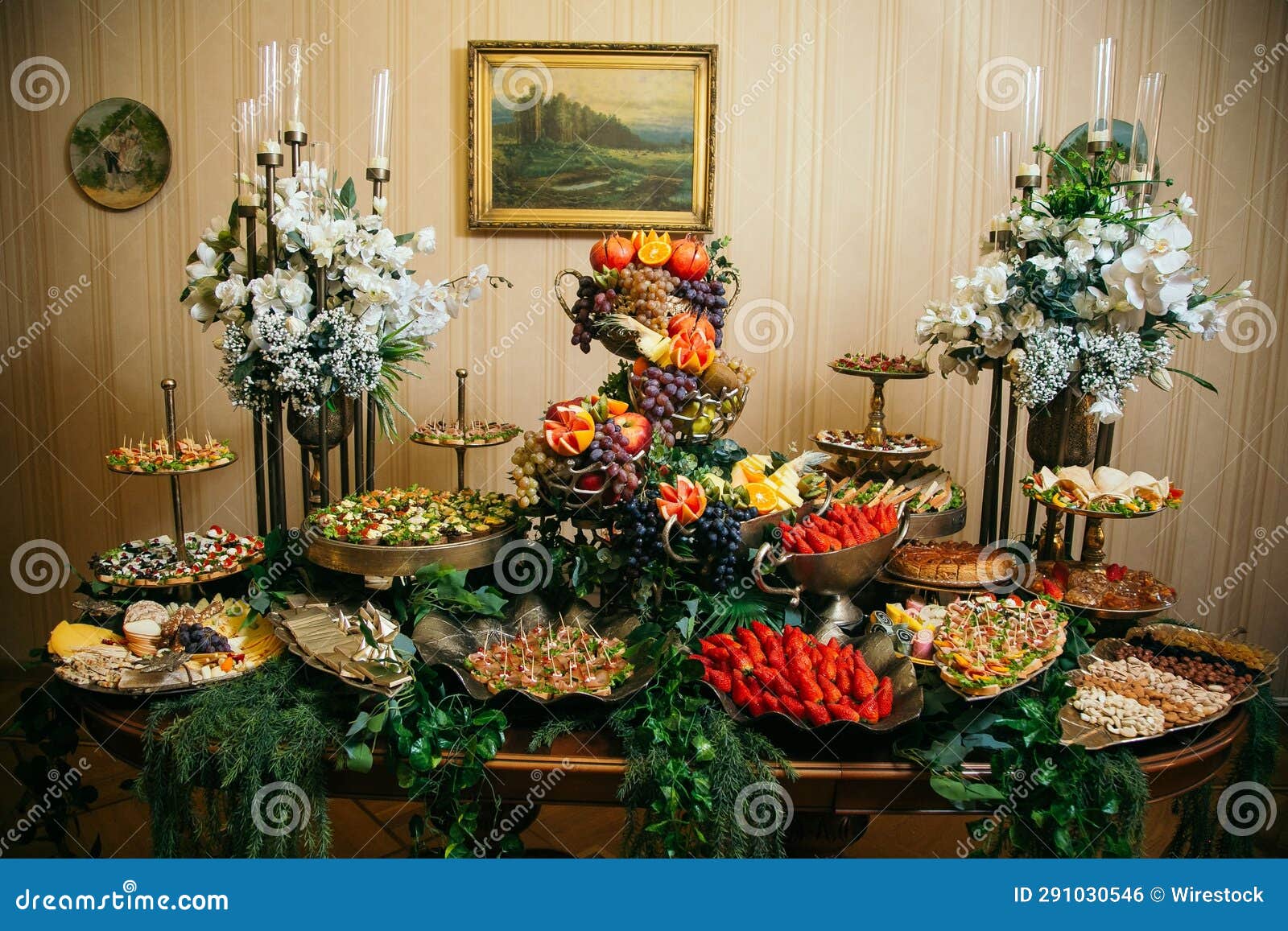 This Table Has an Arrangement of Fruit and Other Food in it Stock Photo ...