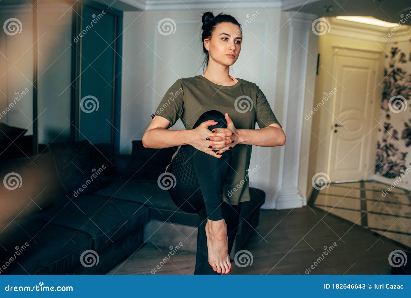 Image Of Fit Young Woman Exercising At Home Stretching Legs In The
