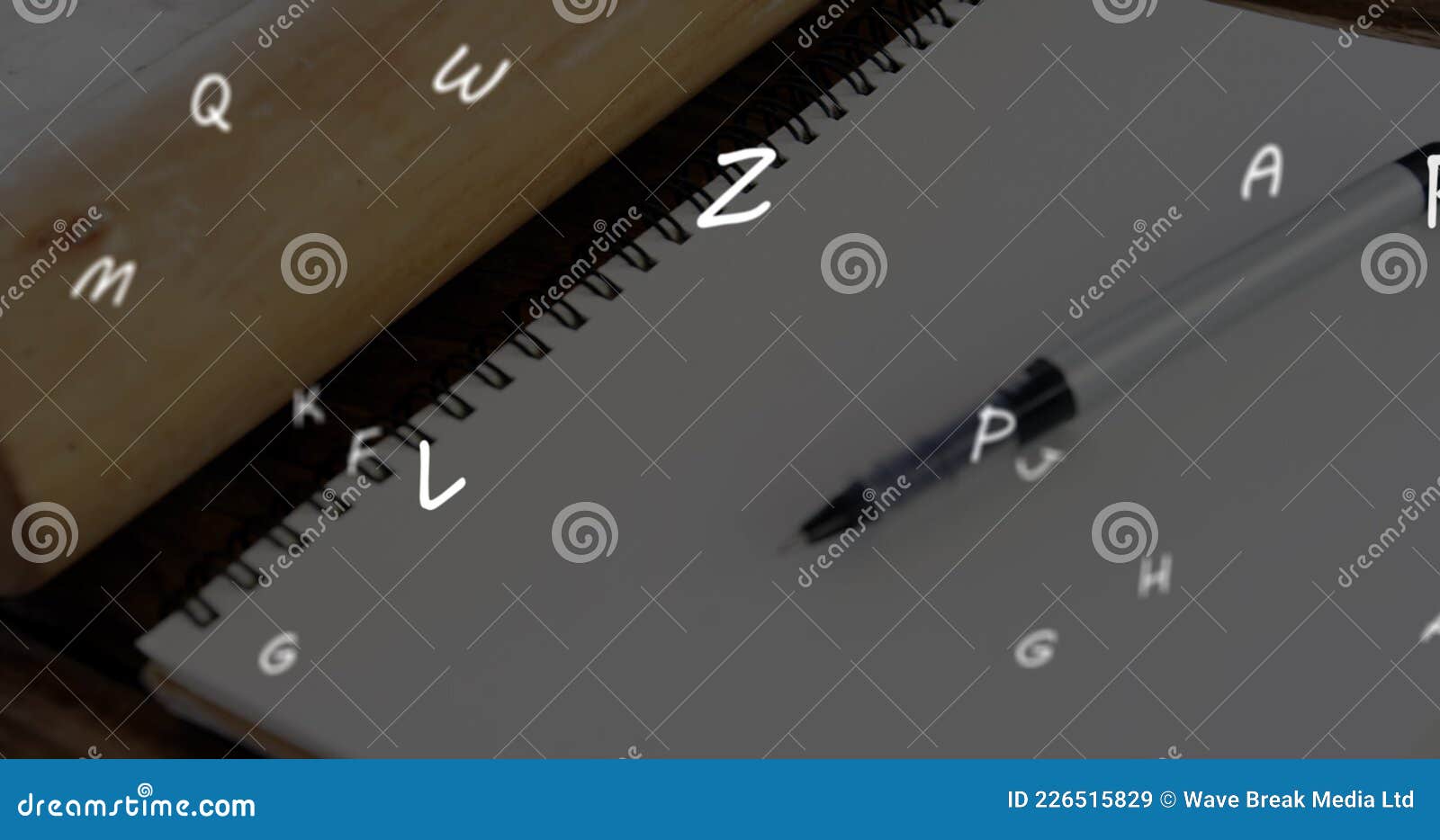 Image of Floating Letters Over a Pen Lying on a Notebook Stock Image ...