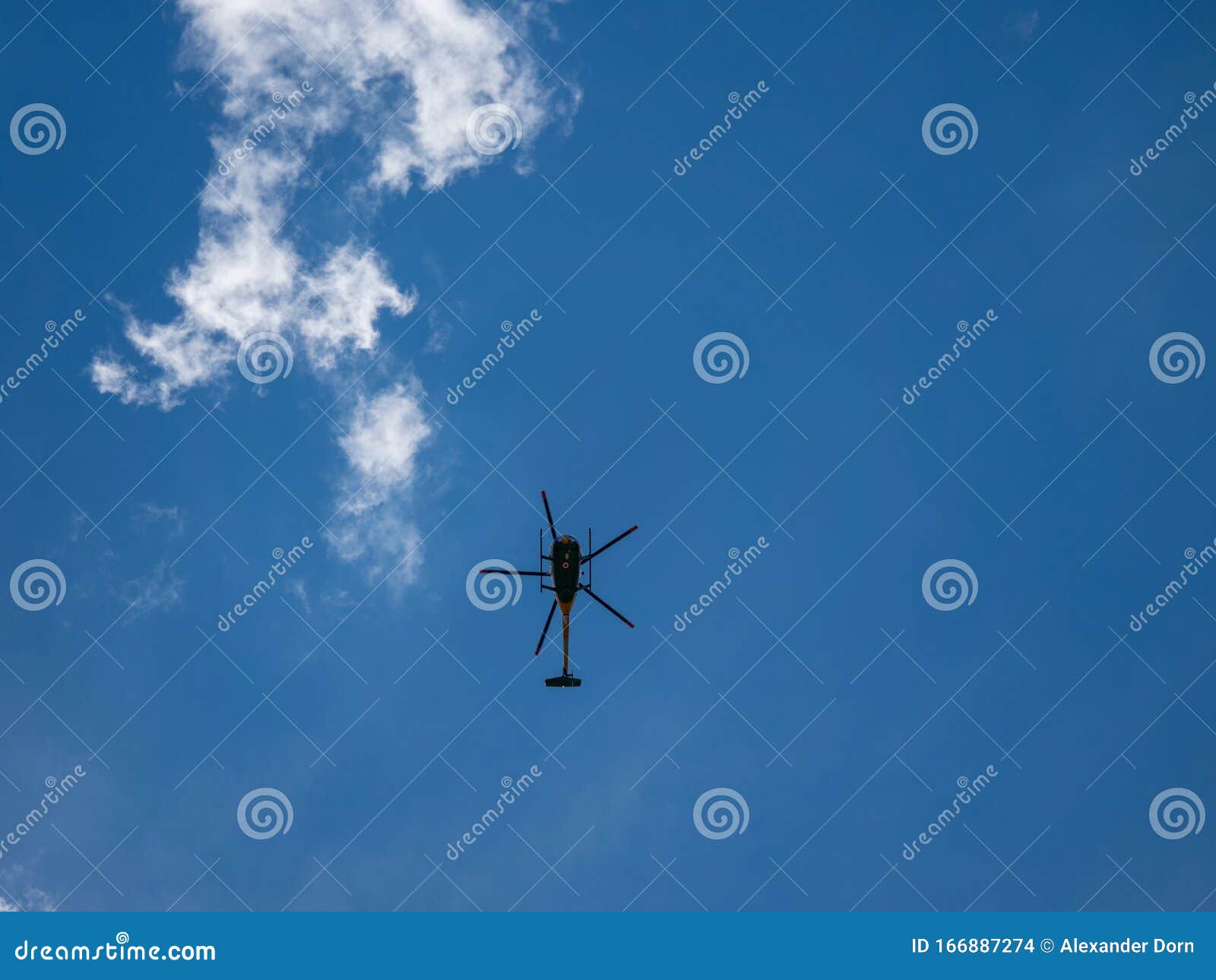 Image of Flying Helicopter with Blue Sky from Below Stock Photo - Image ...