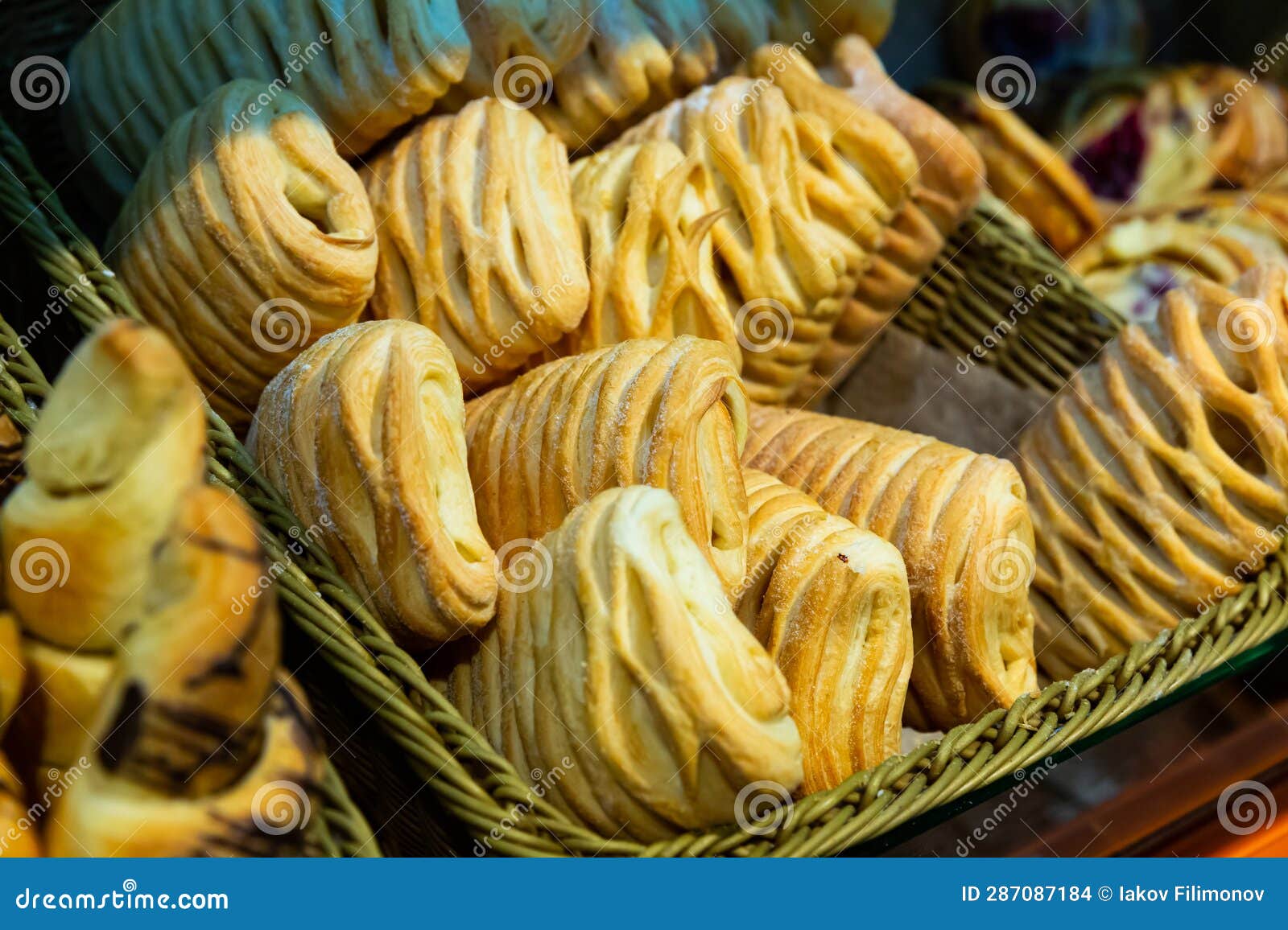 Image of Fresh Puff Cakes at Counter in Supermarket Stock Photo - Image ...