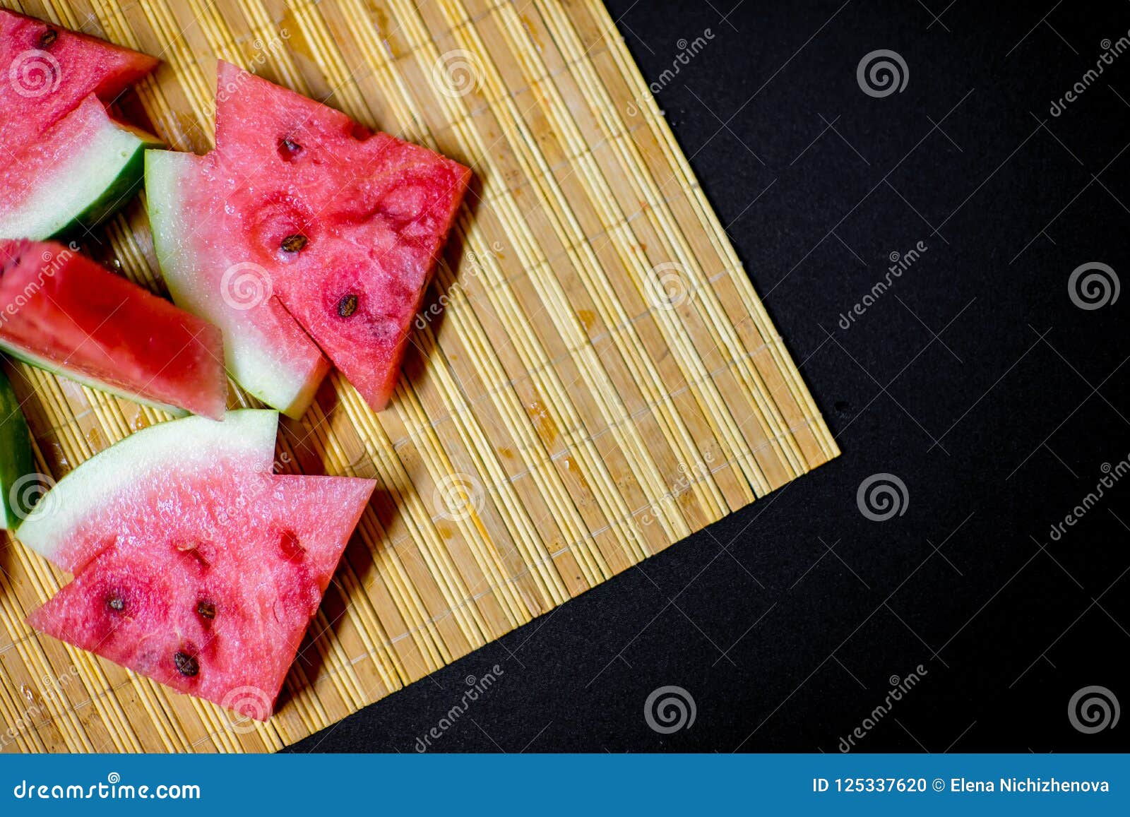 An Image of a Fresh Sliced Red Watermelon on a Table Stock Photo ...