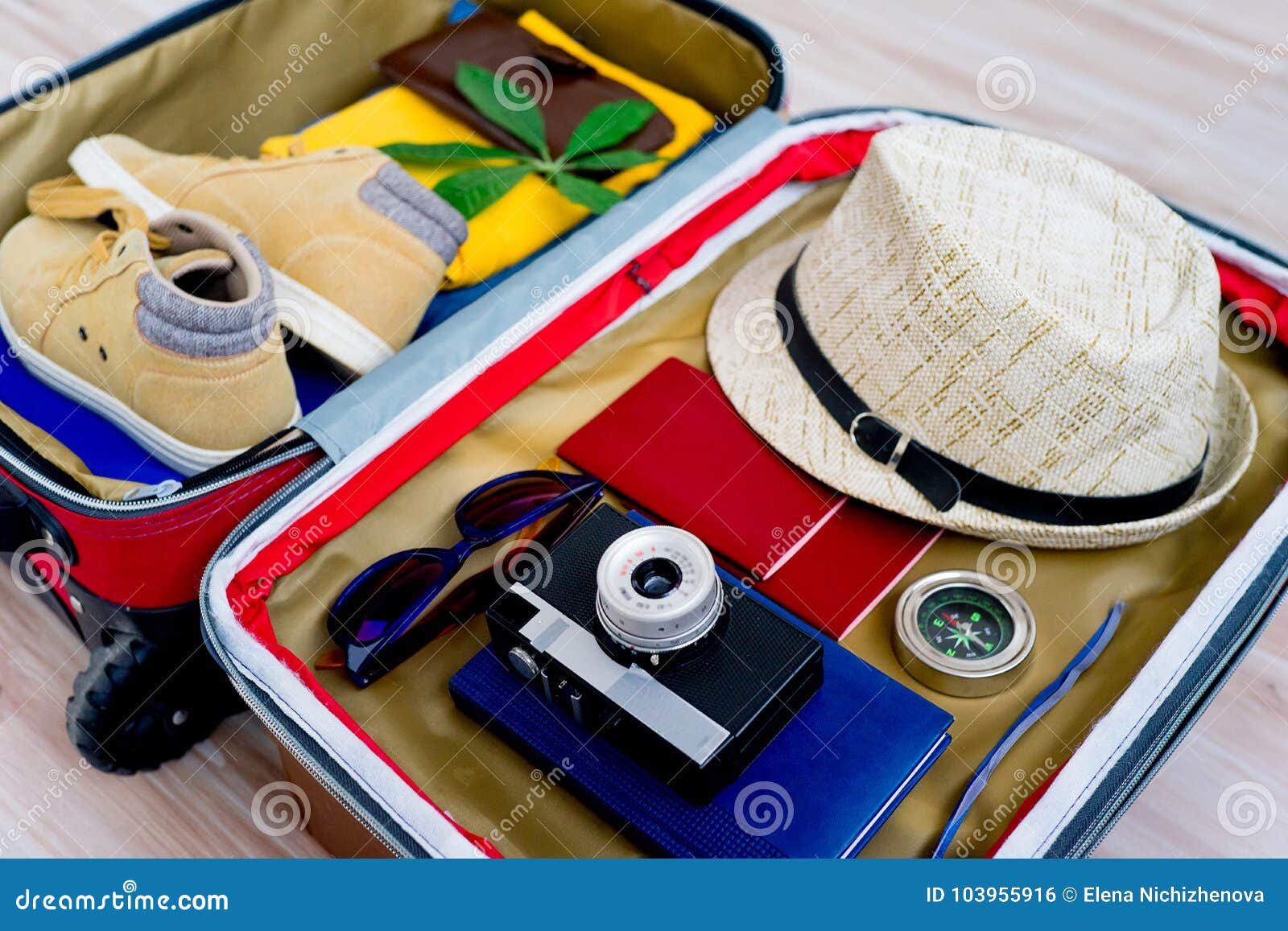 Full packed suitcase stock photo. Image of packing, sunglasses - 103955916