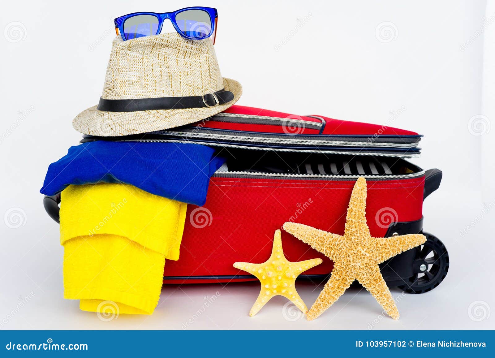 Full packed suitcase stock photo. Image of casual, shoes - 103957102