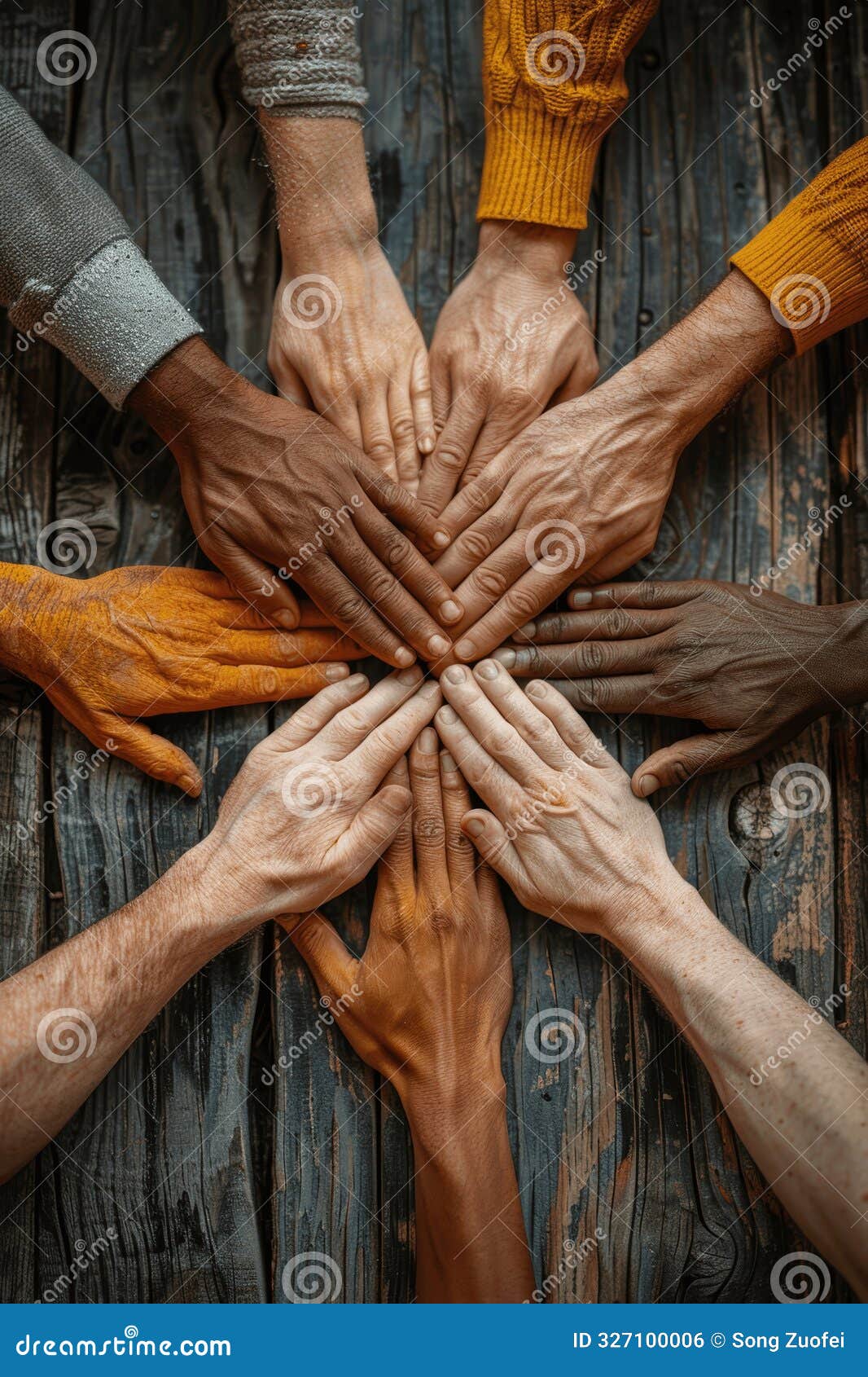 Diverse Hands Forming a Circle on Wooden Surface Representing Unity ...