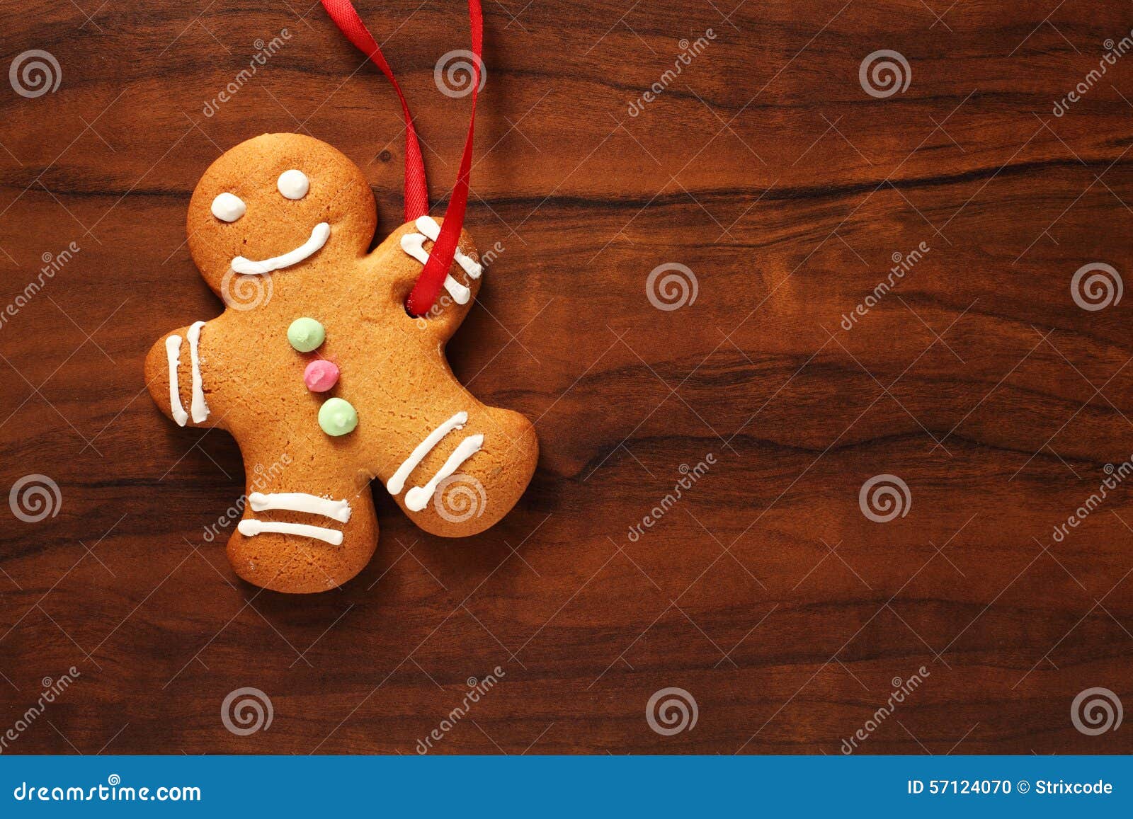 Image of Gingerbread Man Cookie Over Brown Wooden Texture Stock Photo ...