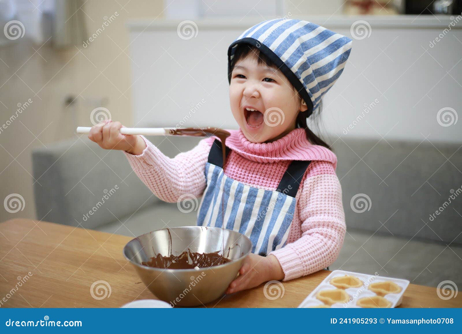 Girl making sweets stock image. Image of indoors, bowl - 241905293