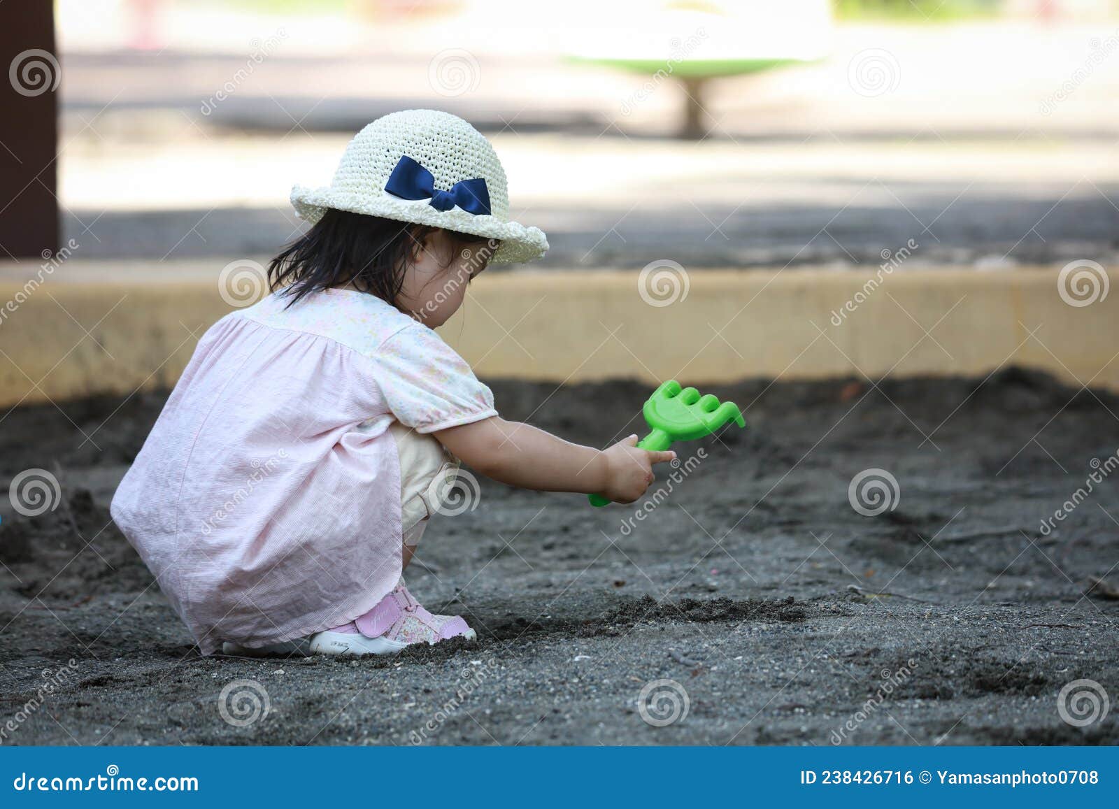 Girl Playing in the Sandbox Stock Photo - Image of outdoor, training ...