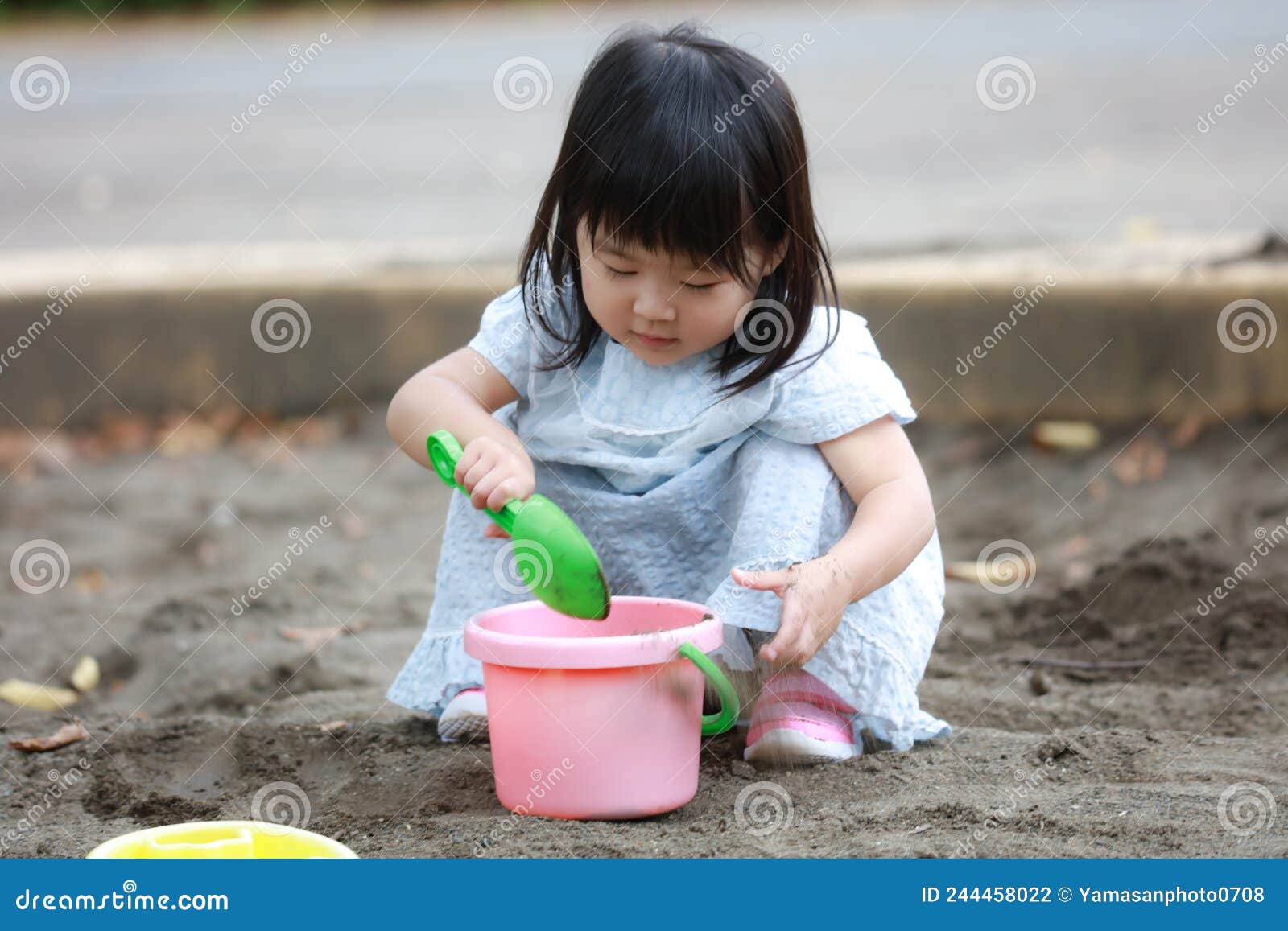 Girl Playing in the Sandbox Stock Photo - Image of daytime, girl: 244458022