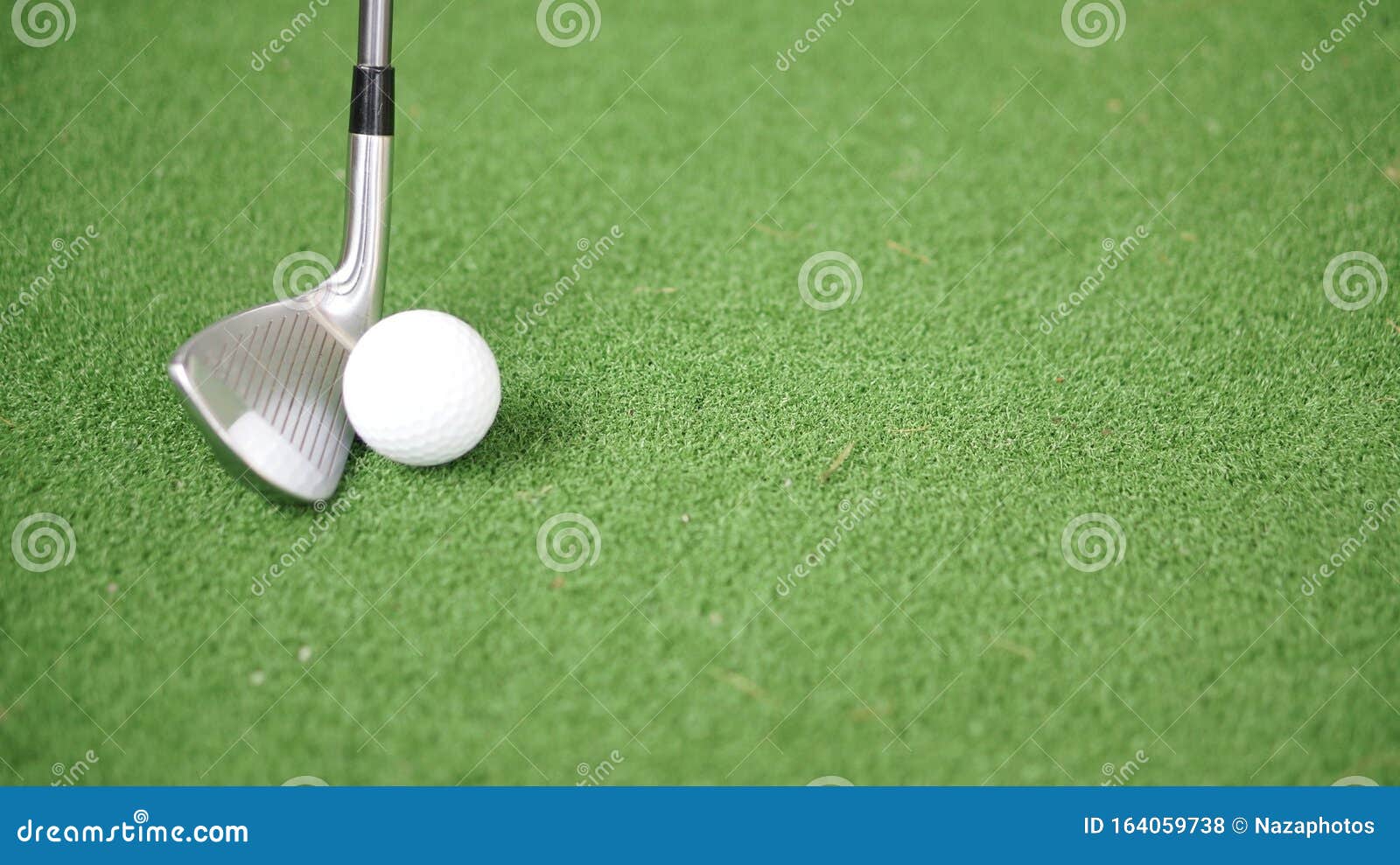 Image of Golf Iron or Club and Golf Ball on Green Grass Stock Photo ...