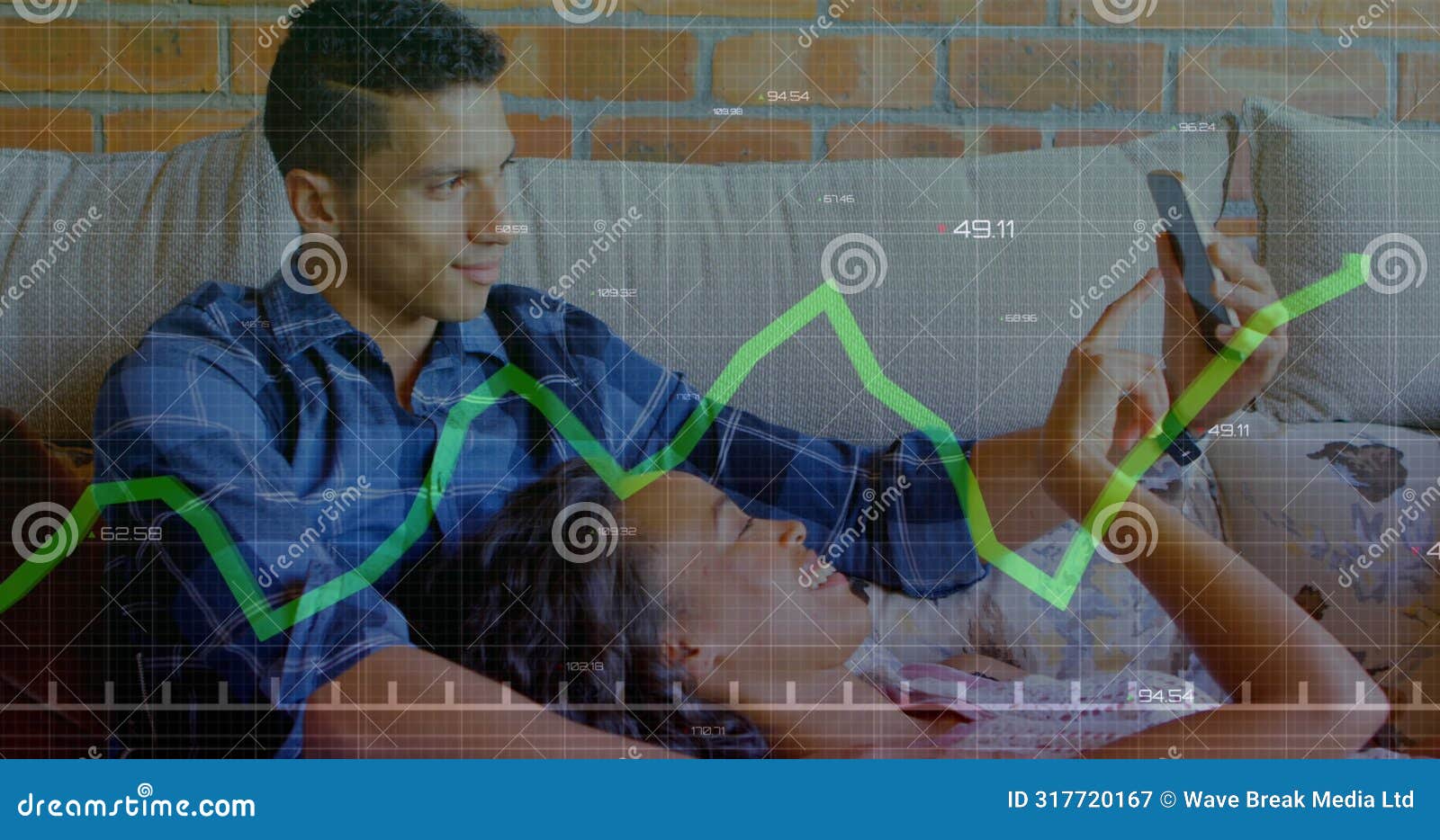 Image of Graph and Changing Numbers, Diverse Couple Watching Images on ...
