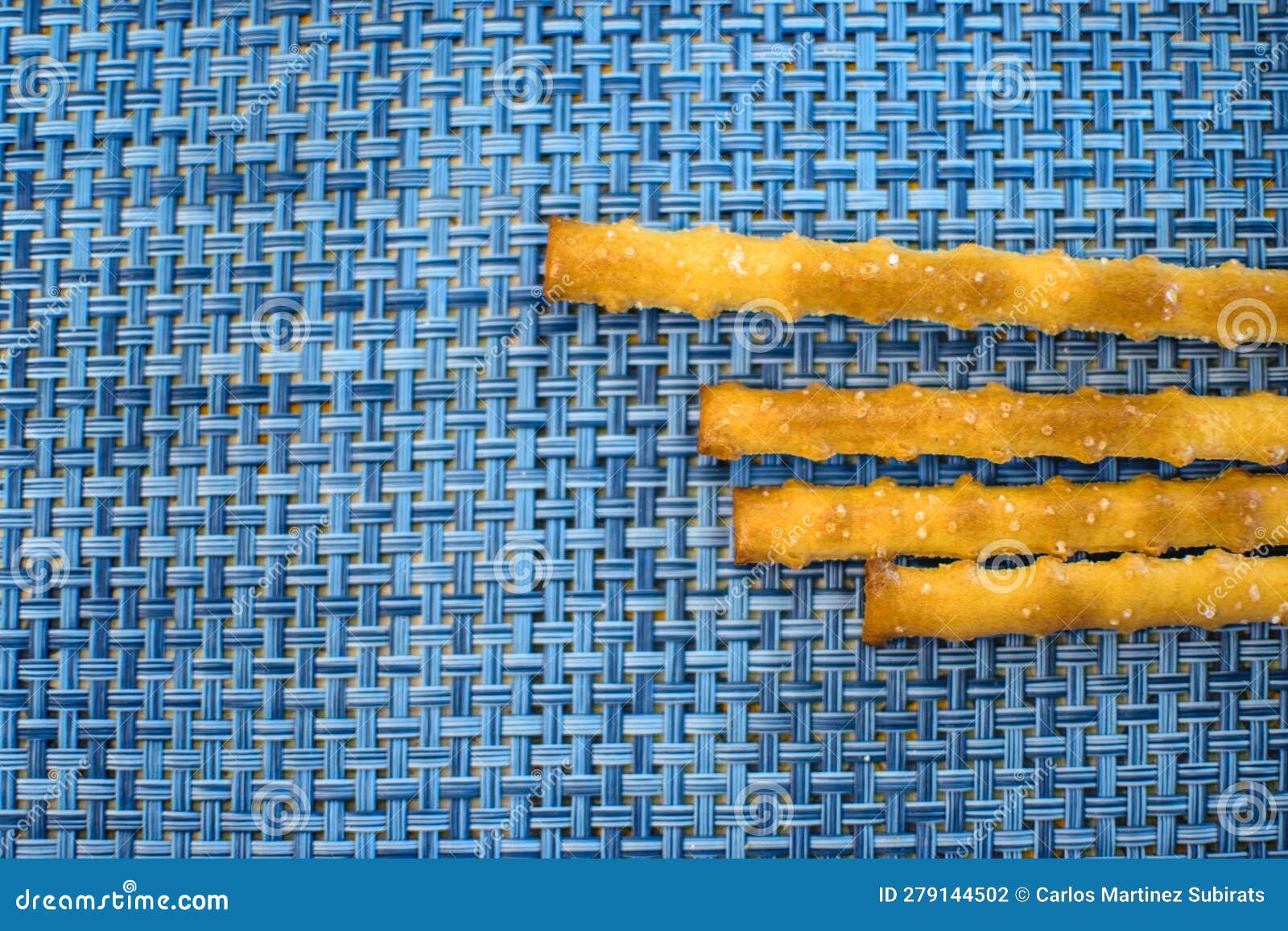 Image of Grissini Breadsticks on Navy Blue Textured Background Stock ...