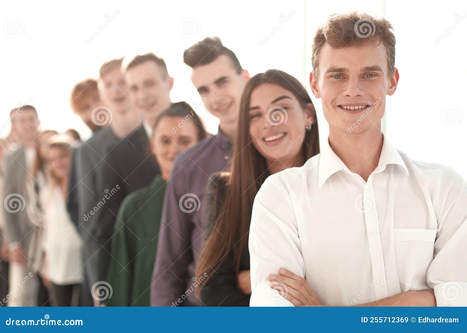 Image of a Group of Young People Standing in a Queue Stock Image ...