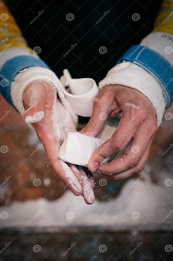 Image of a Gymnast Dusting Their Hands with Chalk before a Performance ...