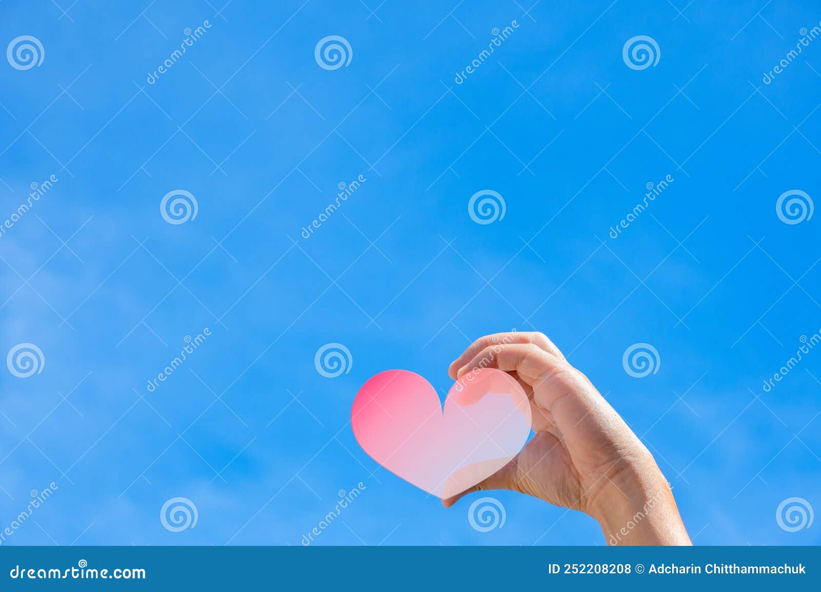 The Image of the Half-heart Hand Symbol Against the Sky Background ...