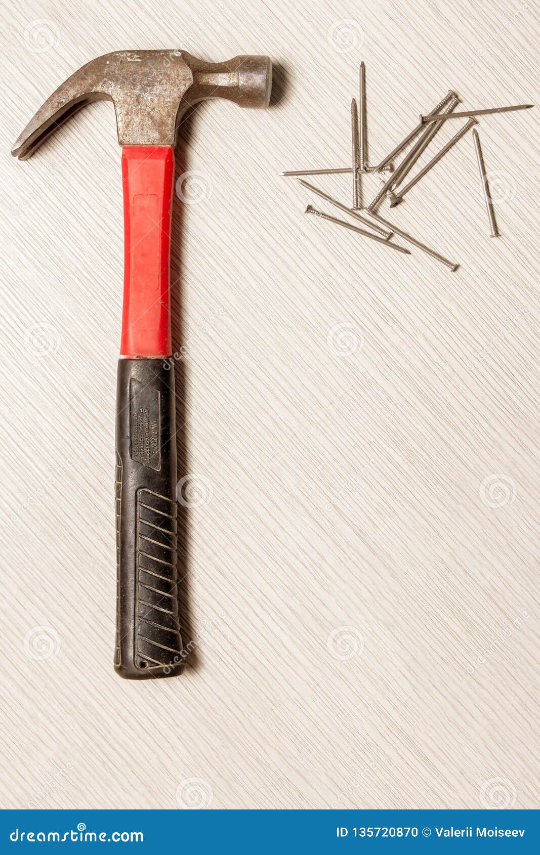 An Image of Hammer and Nails on Wooden Table Stock Photo - Image of ...