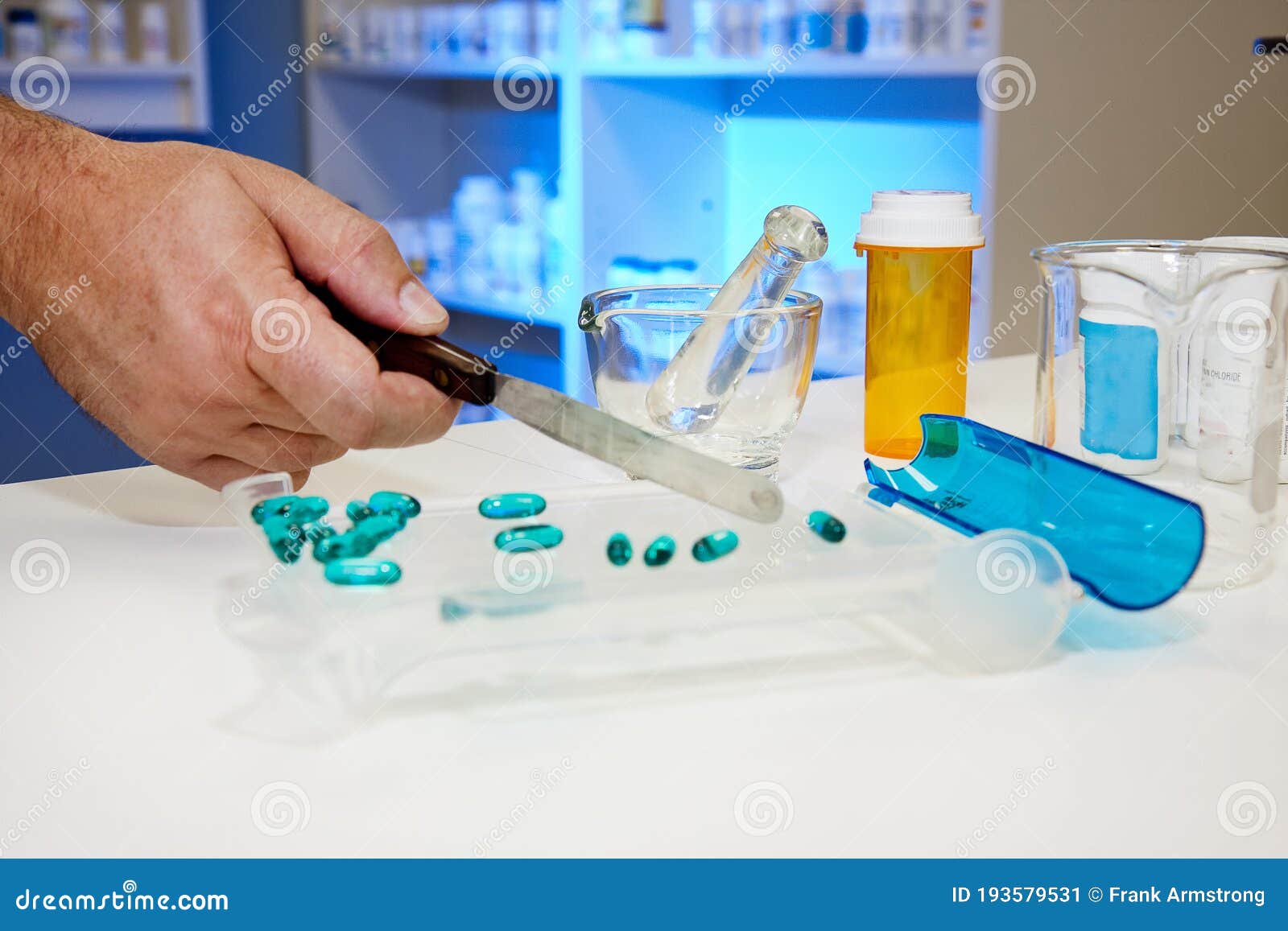 An Image of a Hand Using a Pill Counting Tray with Other Pharmacy ...