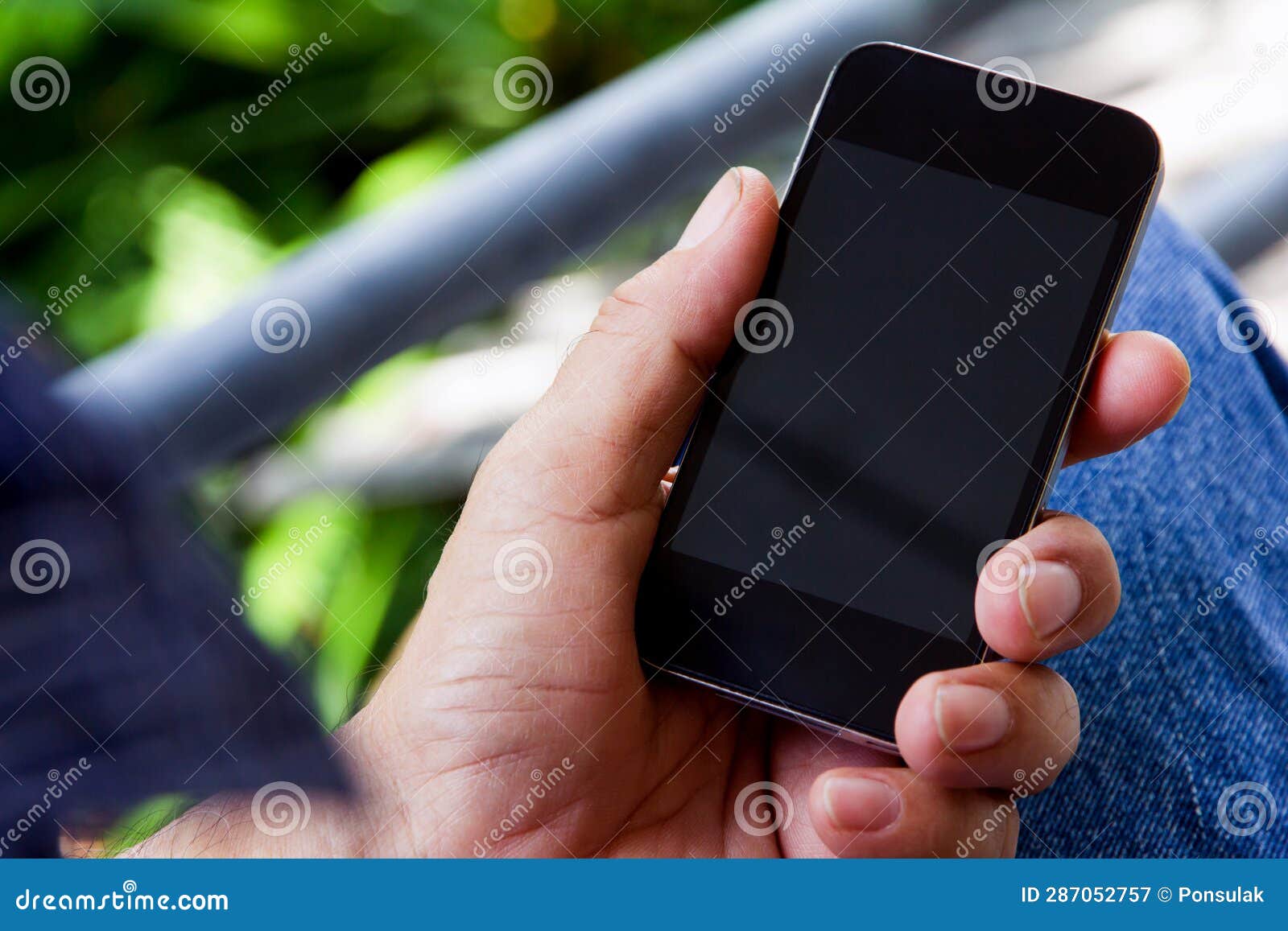 Hands holding mobile phone stock image. Image of brand - 287052757