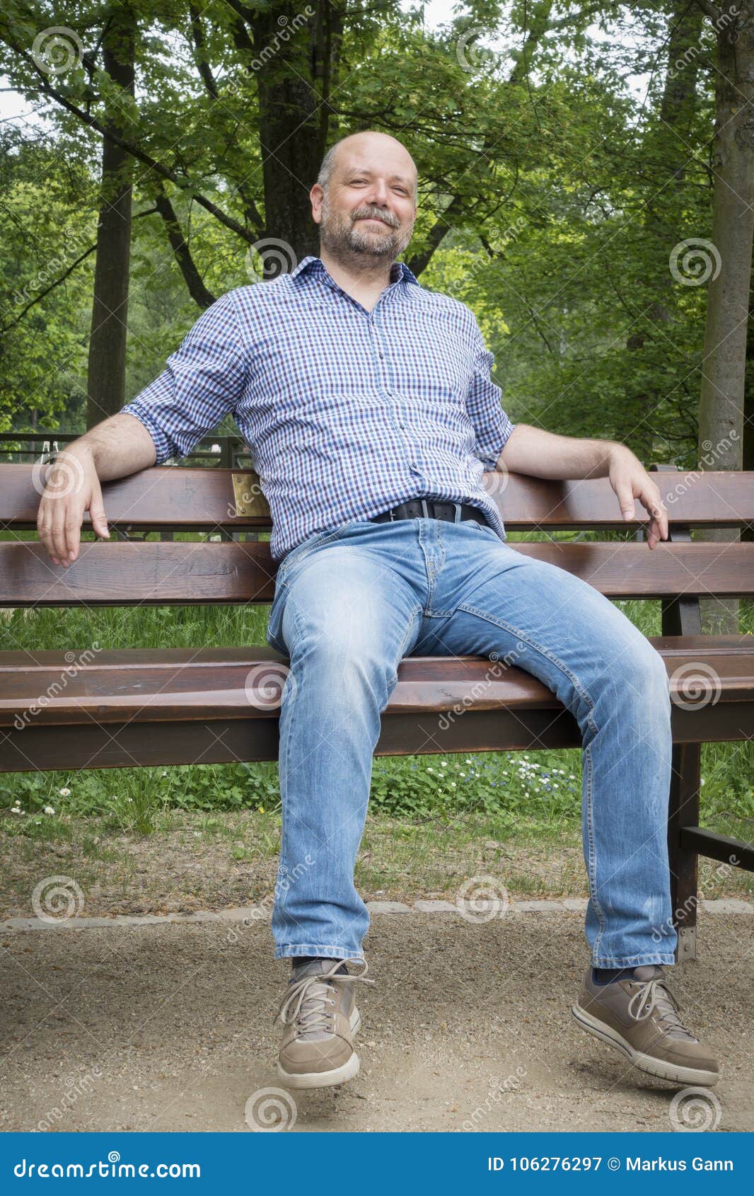 Handsome Bearded Man Sitting Outdoors Stock Image Image Of Green