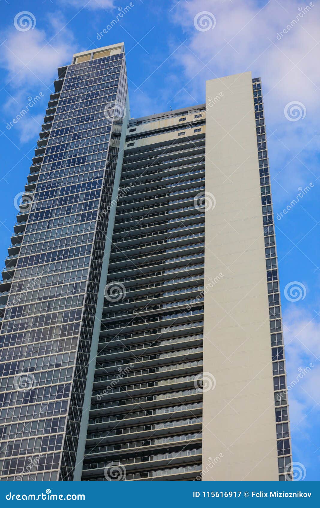 Building on a blue sky stock image. Image of highrise - 115616917