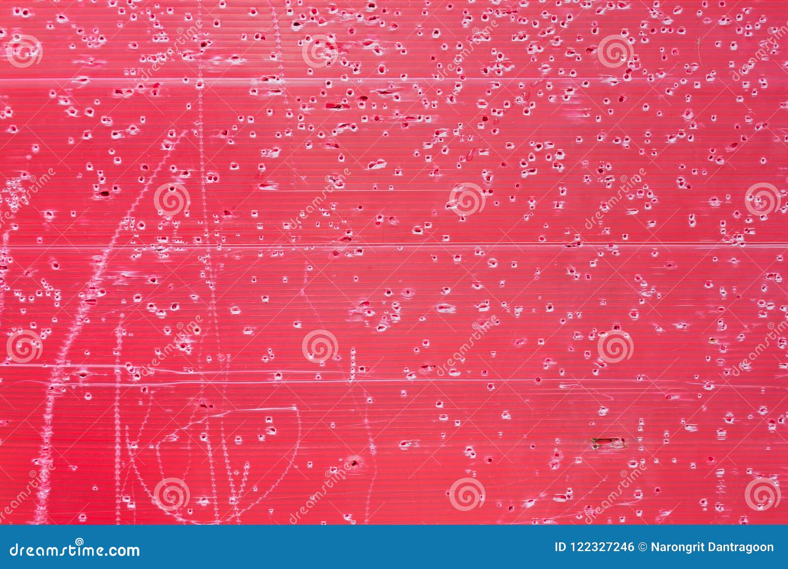 Hole on red plastic board stock photo. Image of texture - 122327246