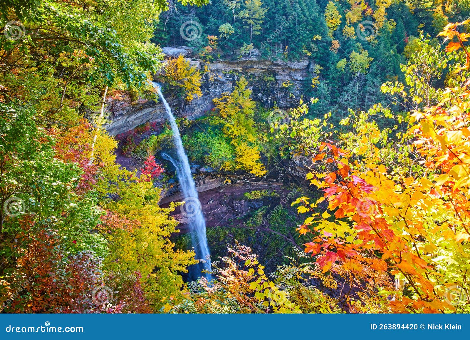 Huge Waterfall Over Cliffs Surrounded by Fall Foliage in New York Stock ...