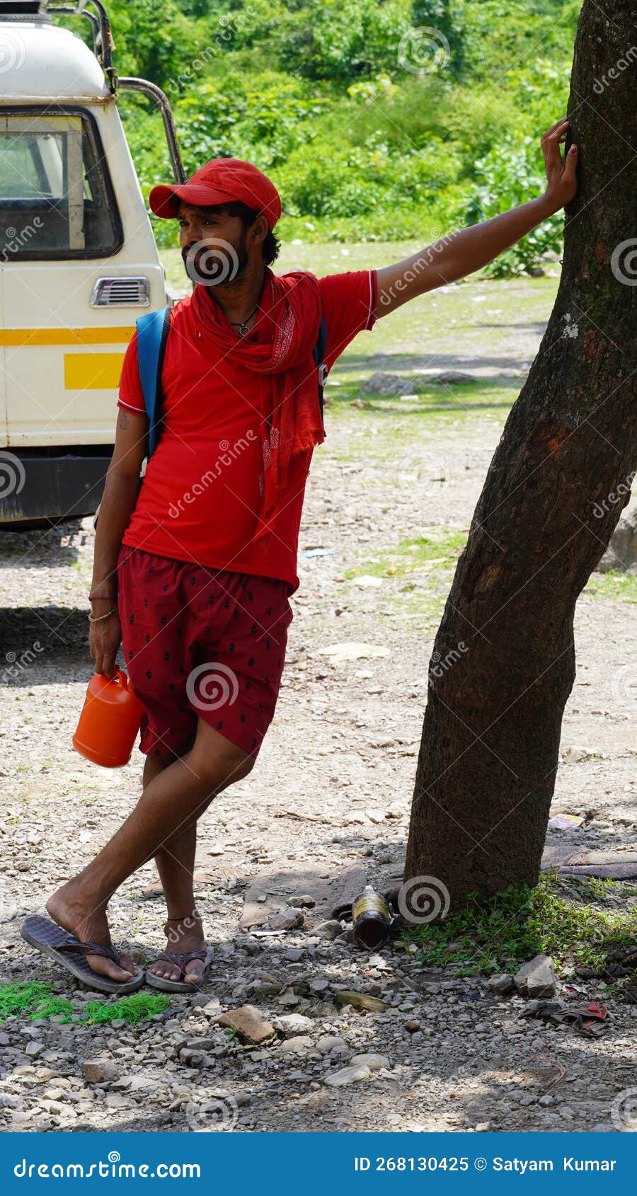 Image of Indian Man Resting Under Tree Editorial Image - Image of water ...