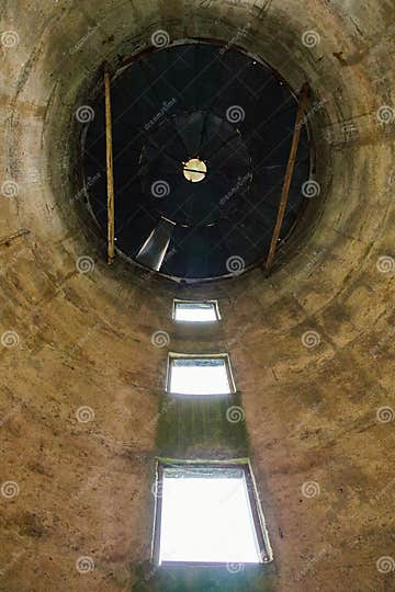 Interior of Old Silo with Busted Windows and Ceiling Like Shutter of a ...