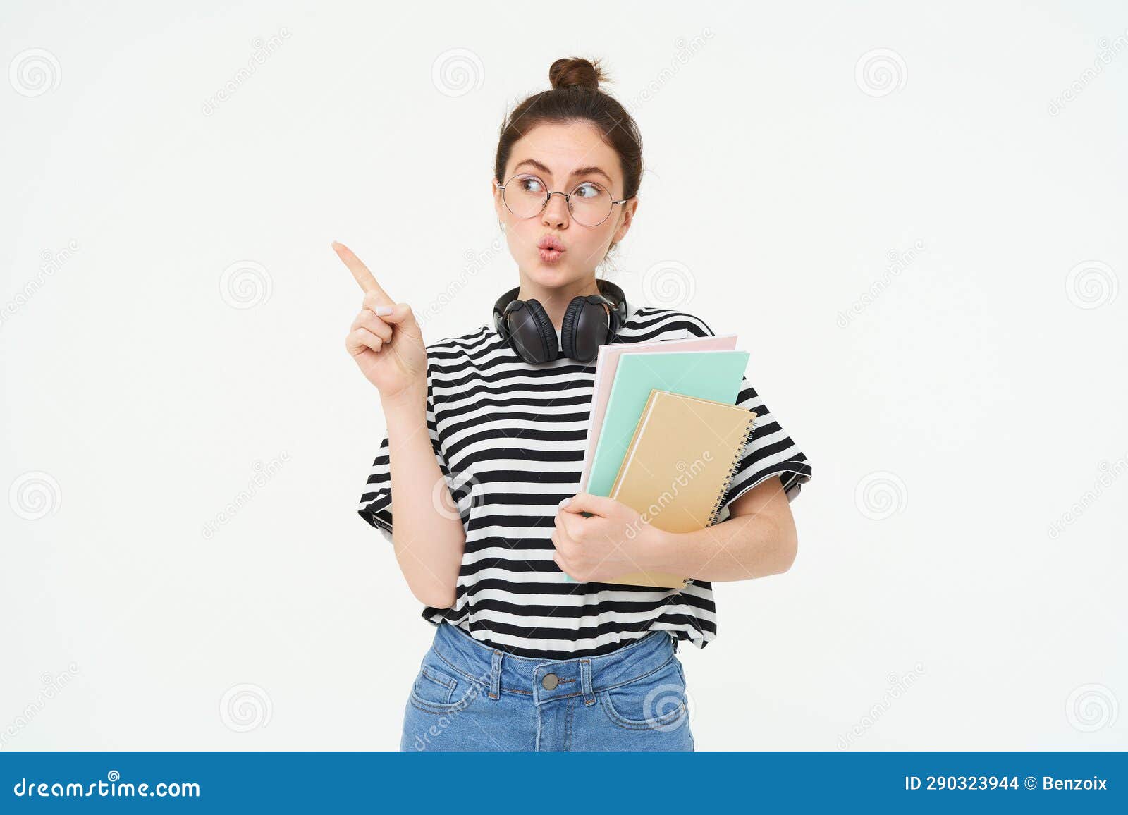 Image of Intrigued Girl in Glasses Points and Looks Left at Smth ...