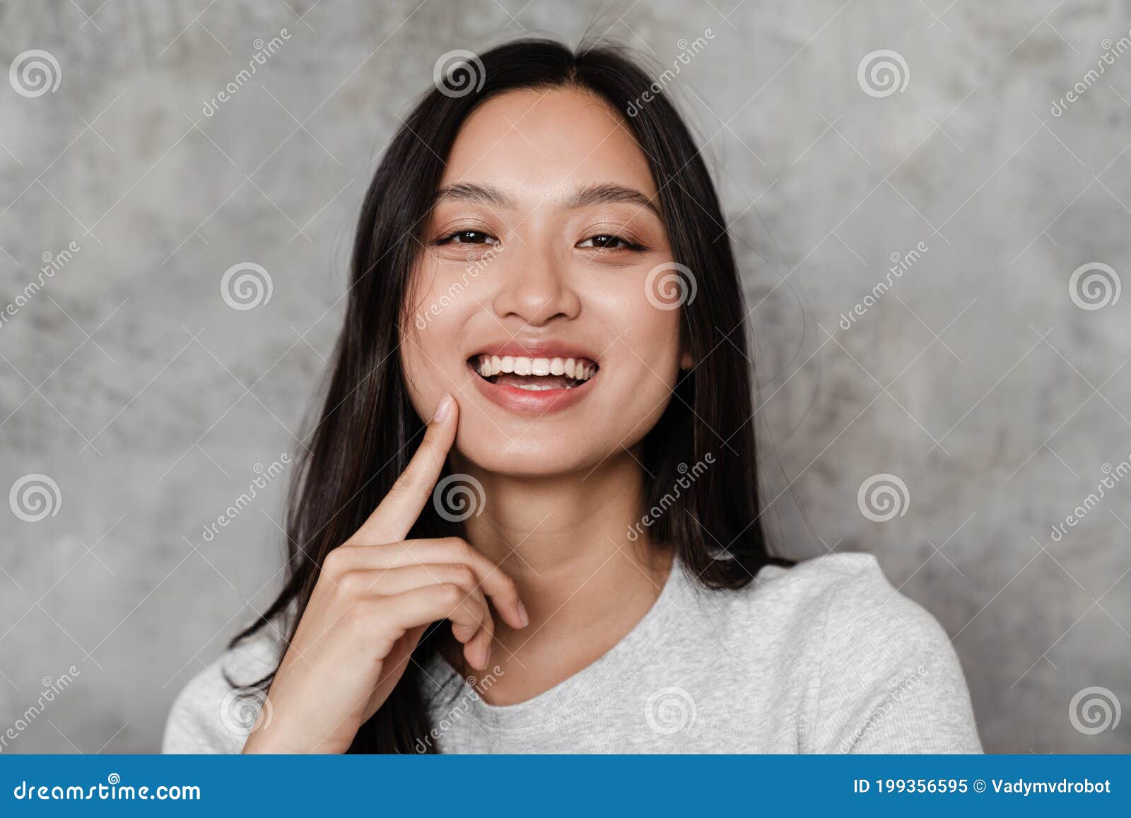 Image Of Joyful Beautiful Asian Girl Laughing And Covering Her Eyes