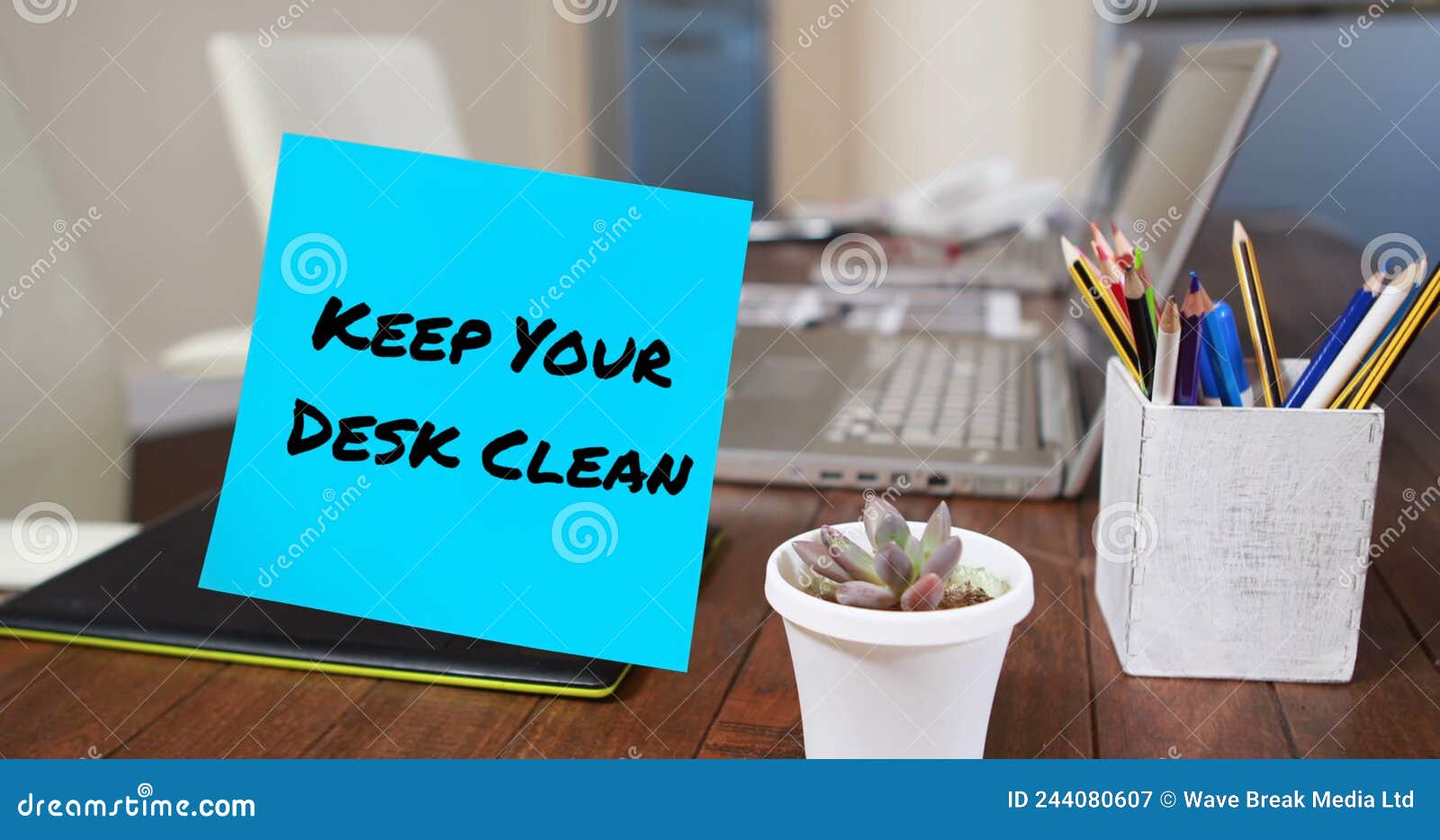 Image of Keep Your Desk Clean Note Over Office Items and Laptops on ...