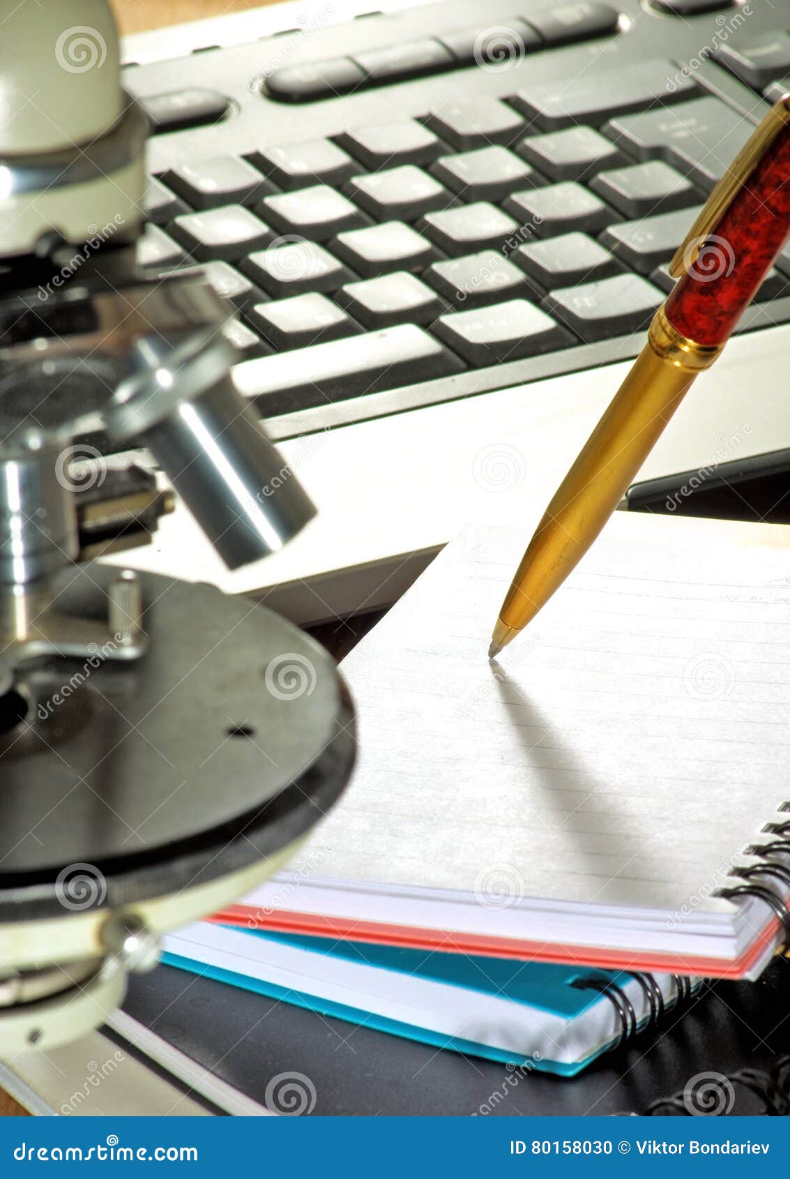 Image of Keyboard ,microscope, Notebook and Pen Closeup Stock Photo ...
