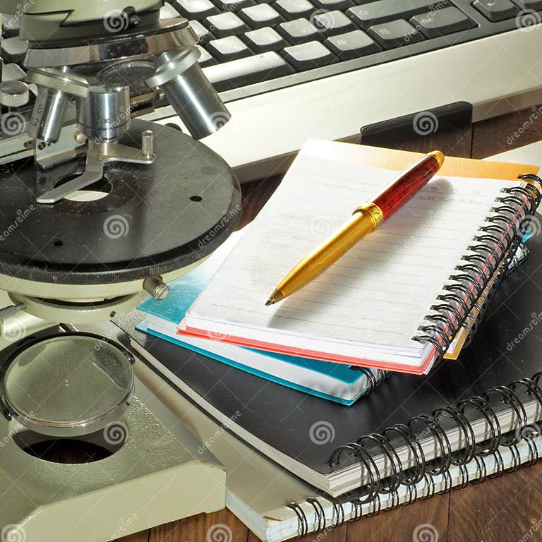 Image of Keyboard ,microscope, Notebook and Pen Closeup Stock Image ...