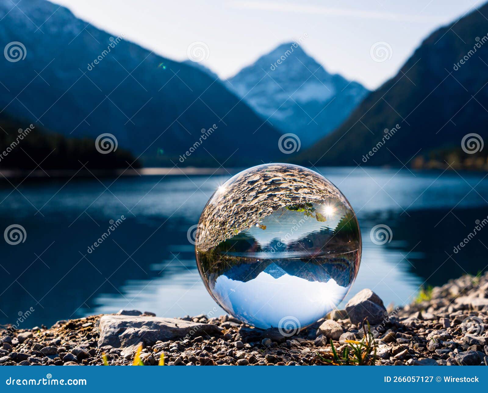 Image of a Lake in the Middle of the Mountains from the Glass Sphere on ...