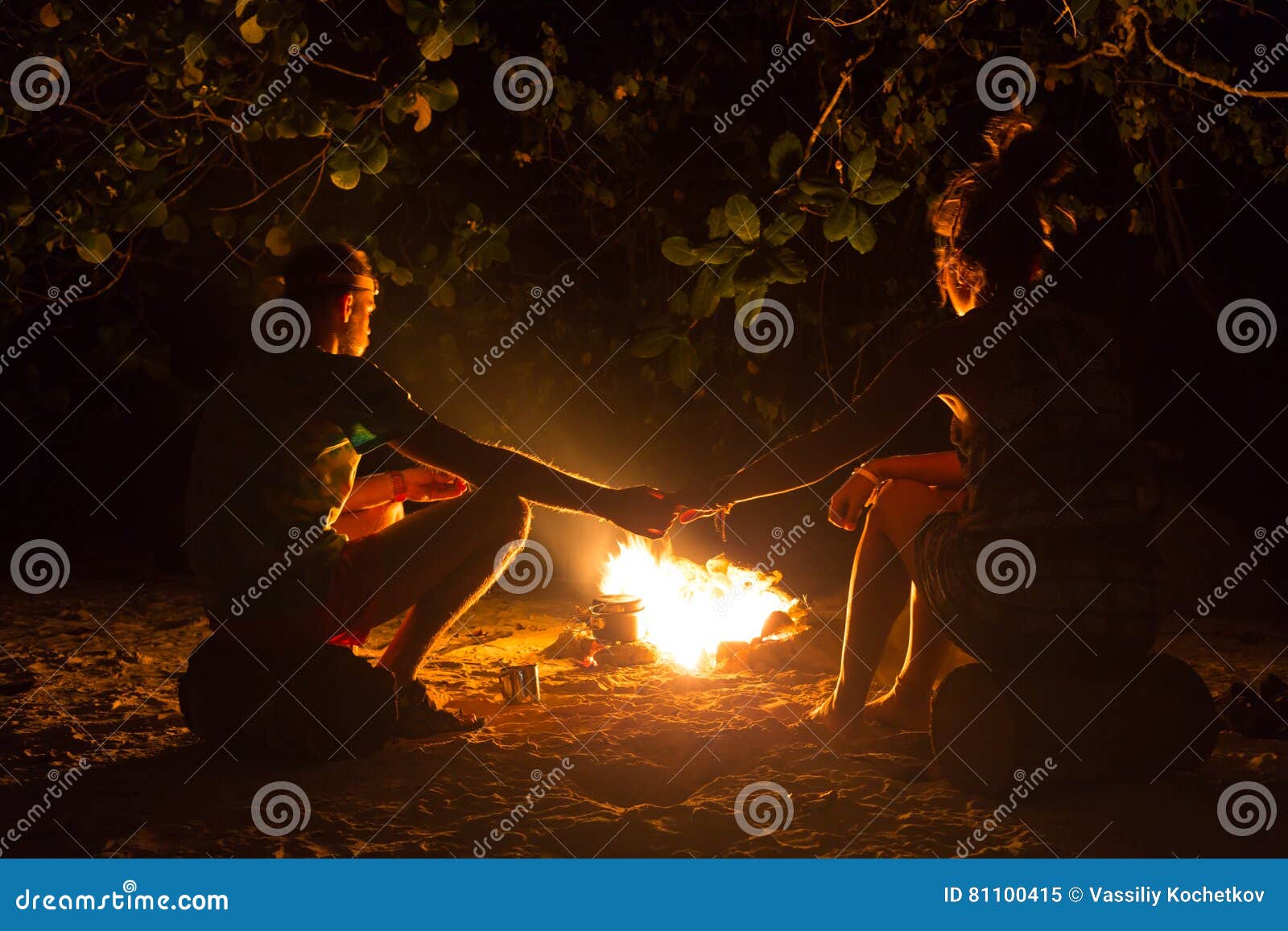Image of a Large Campfire, Around Which People Basking in the Mountains ...