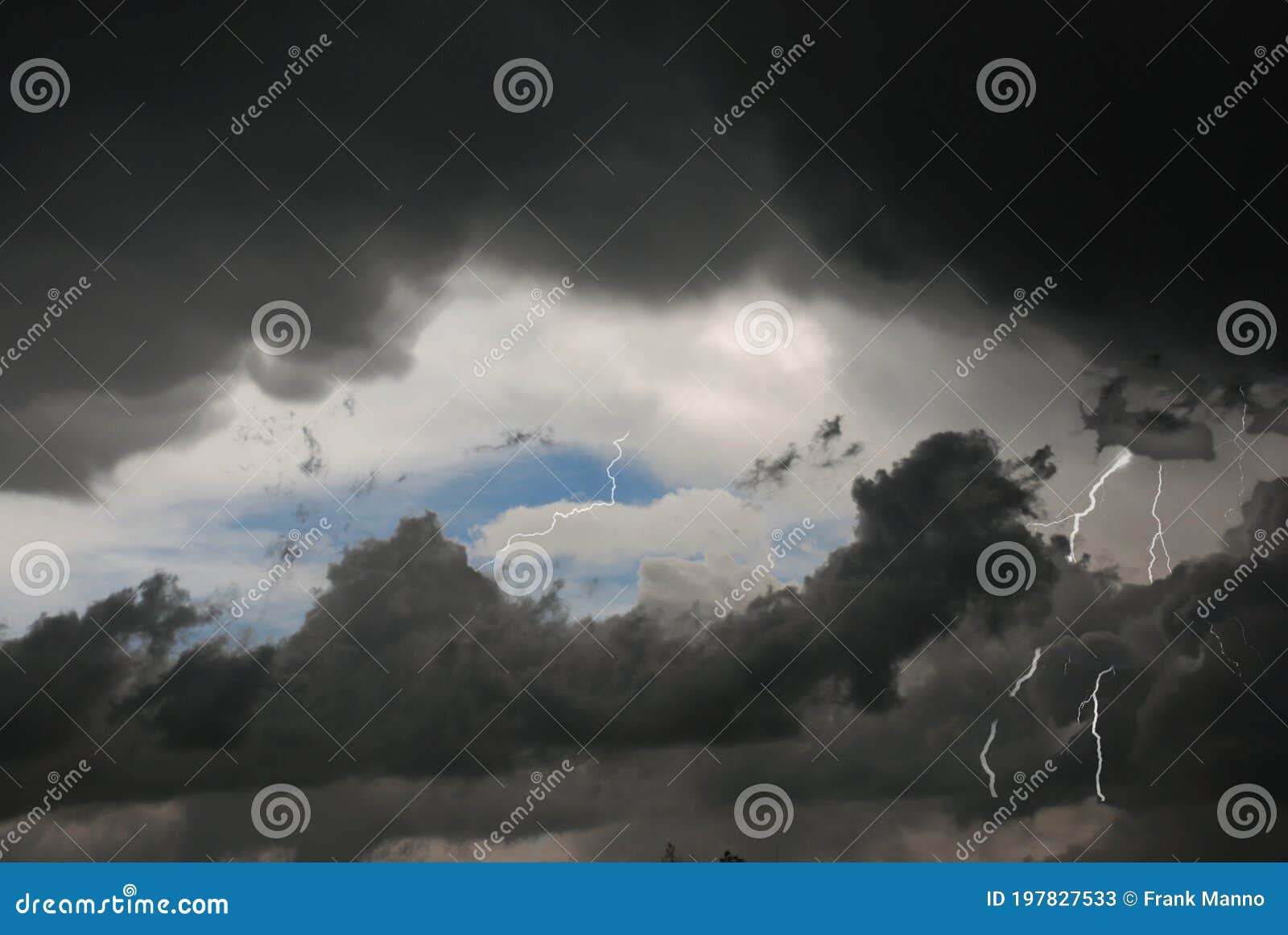 Lightning Strikes from Gathering Storm Clouds Against Sa Blue Sky Stock ...