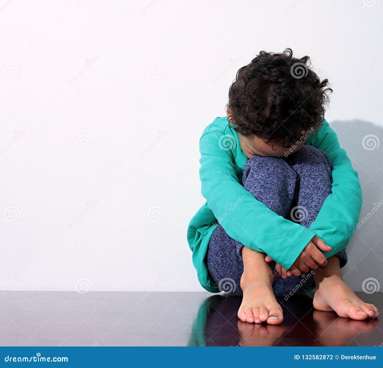 Boy crying in poverty stock photo. Image of despair - 132582872
