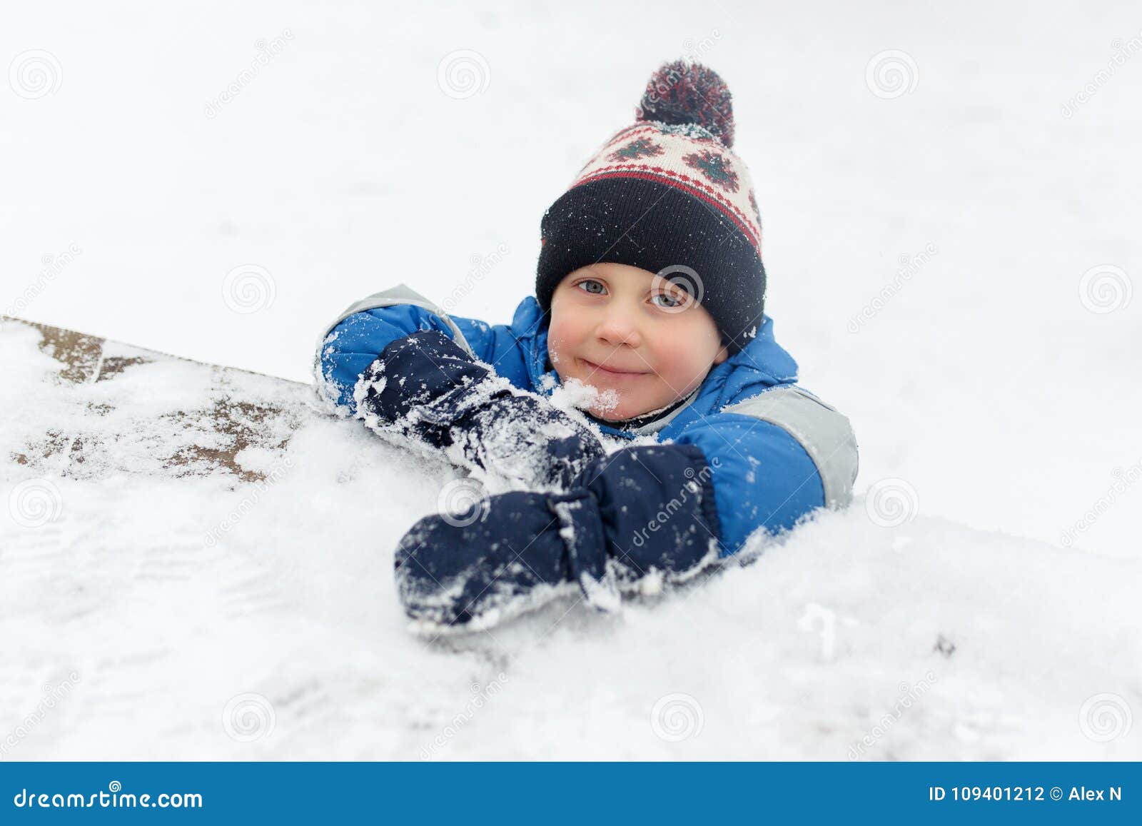 Image of Little Boy in Snow on Park Stock Photo - Image of attractive ...