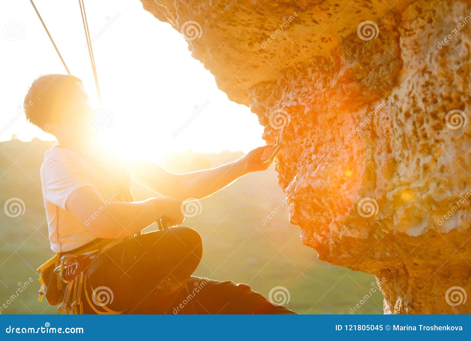 Image of Man Clambering Over Rock. Stock Image - Image of leisure ...