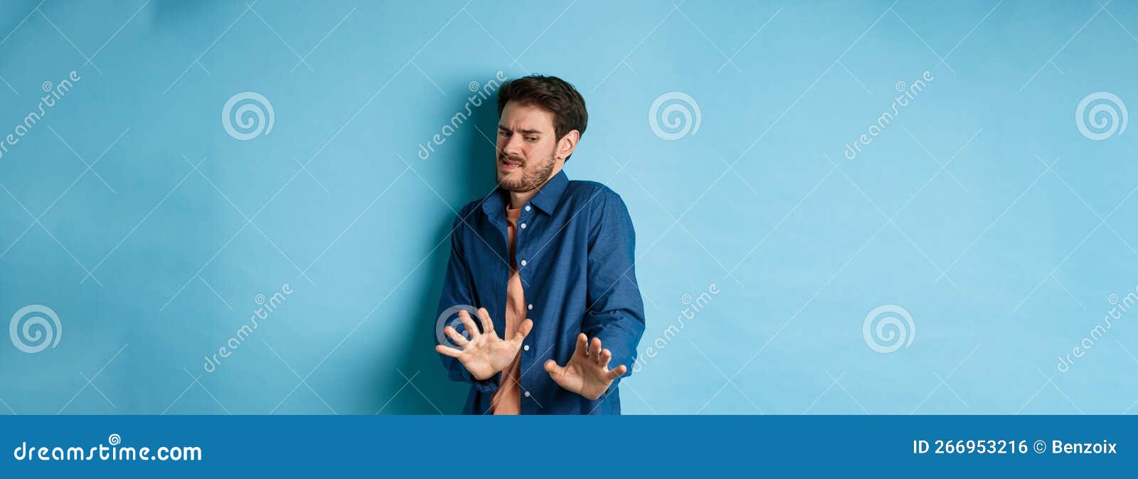 Image of Man Cringe and Look at Something Disgusting, Step Back from ...